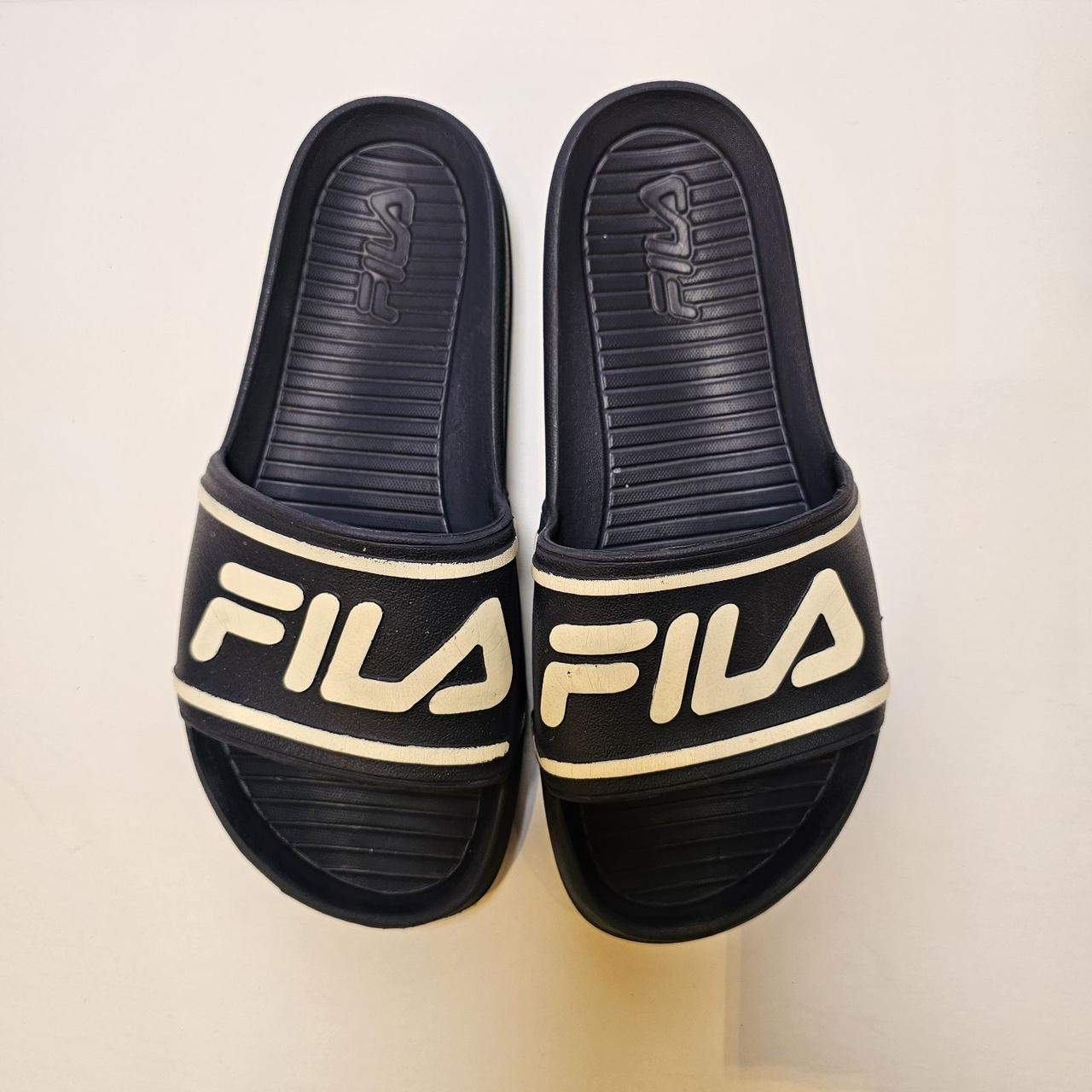Fila navy blue slides size 7 US - Depop