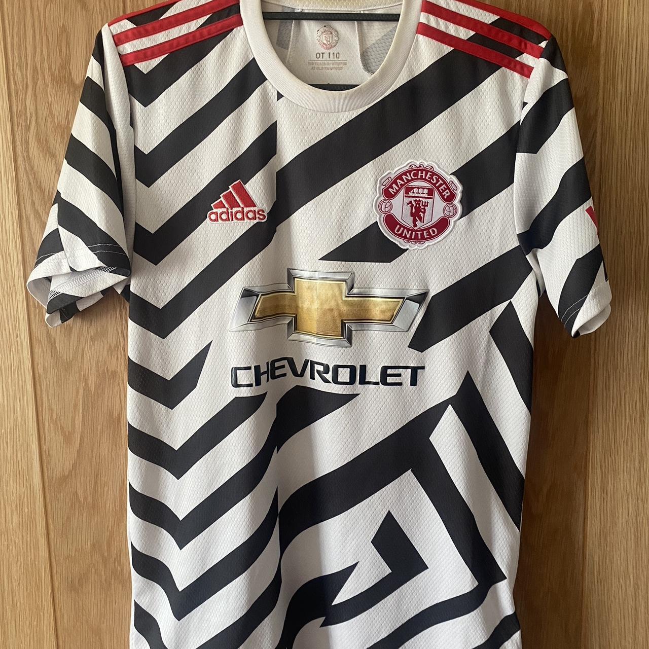 Manchester United Zebra away shirt hardly worn like... - Depop