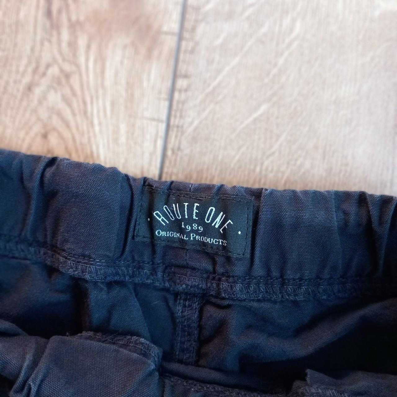 Washed out black Route One trousers. Cuffed ankles... - Depop