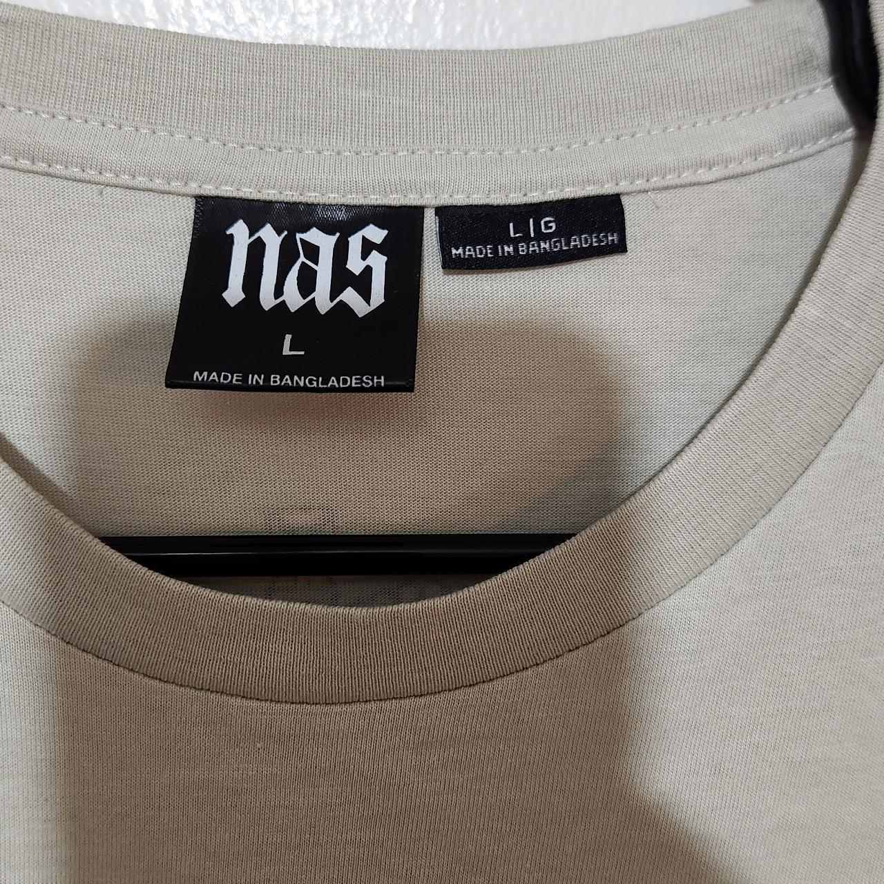 NAS t shirt in good shape and condition size Large... - Depop