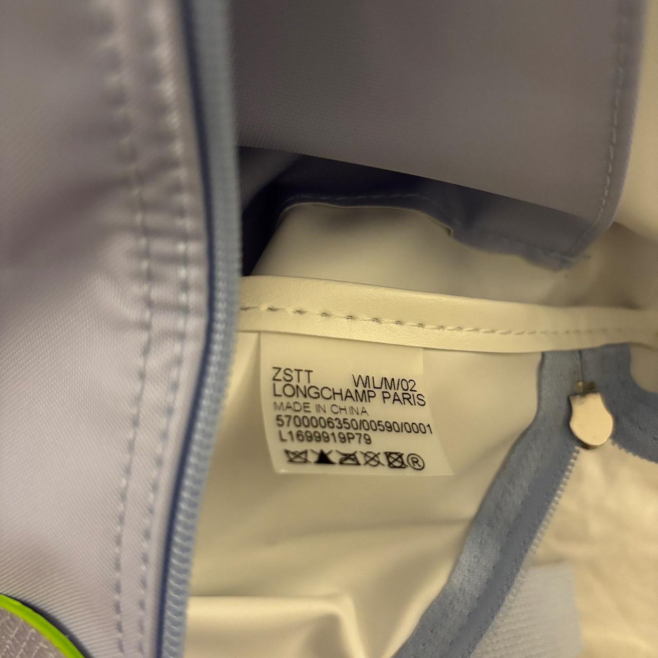 Longchamp le pliage backpack in sky-blue... - Depop