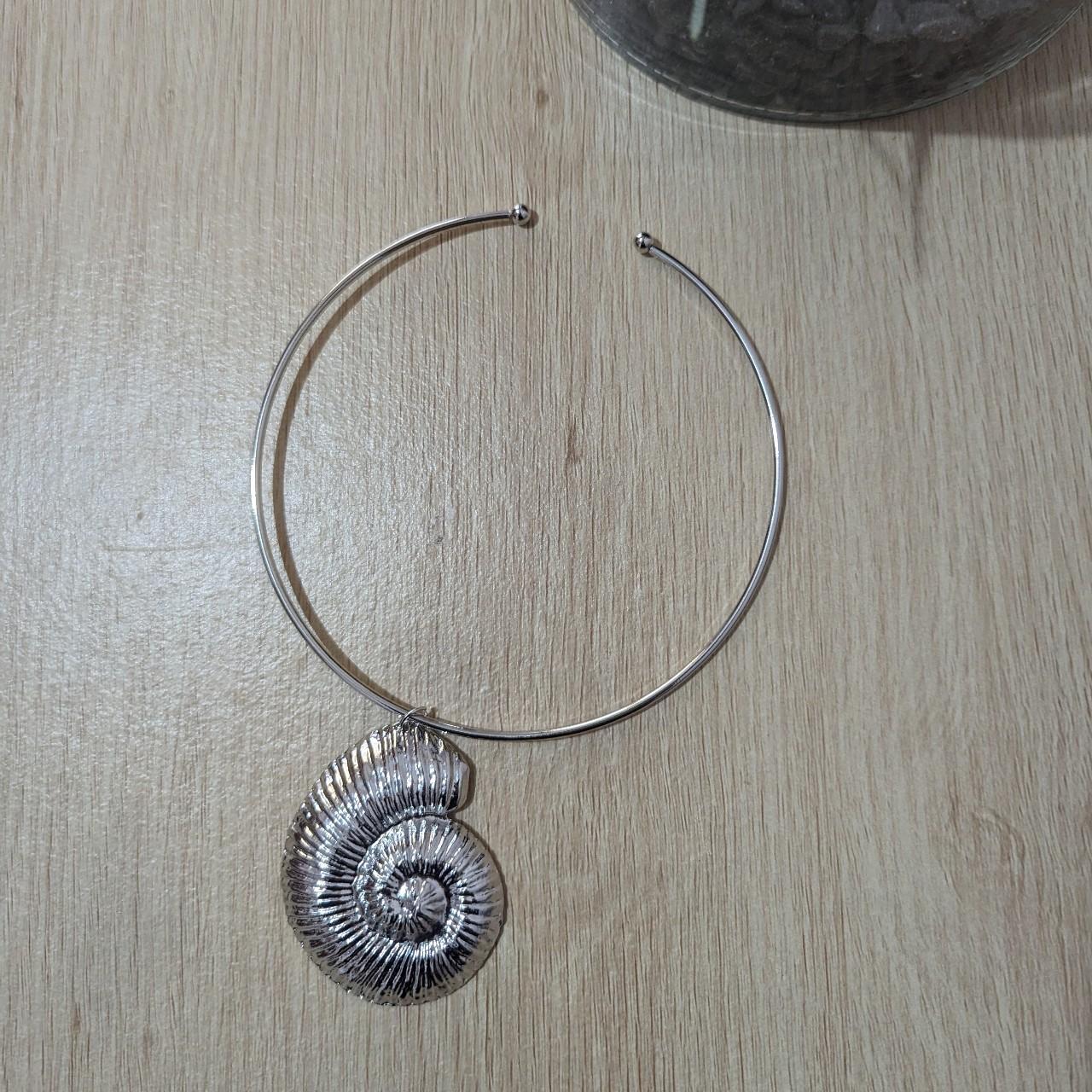 Shell necklace Metal band stretches open to put on... - Depop