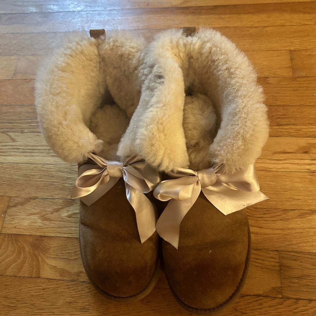 w 10: tan ugg boots w pink satin bow. minor wear and... - Depop