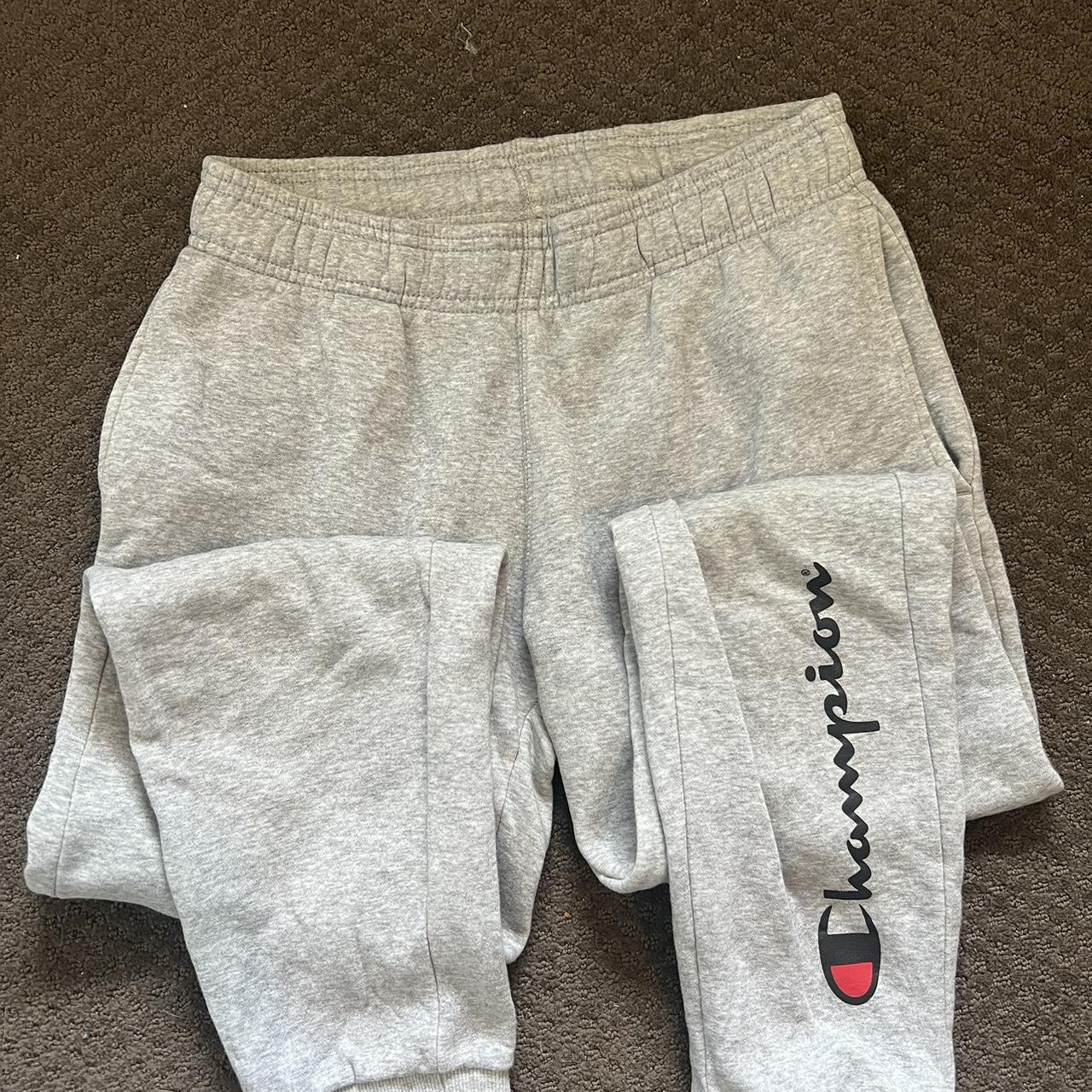 grey champion trackies, small hole on back, youth... - Depop