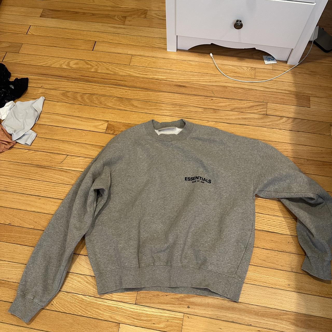 Gray essentials crew neck with black writing runs big - Depop