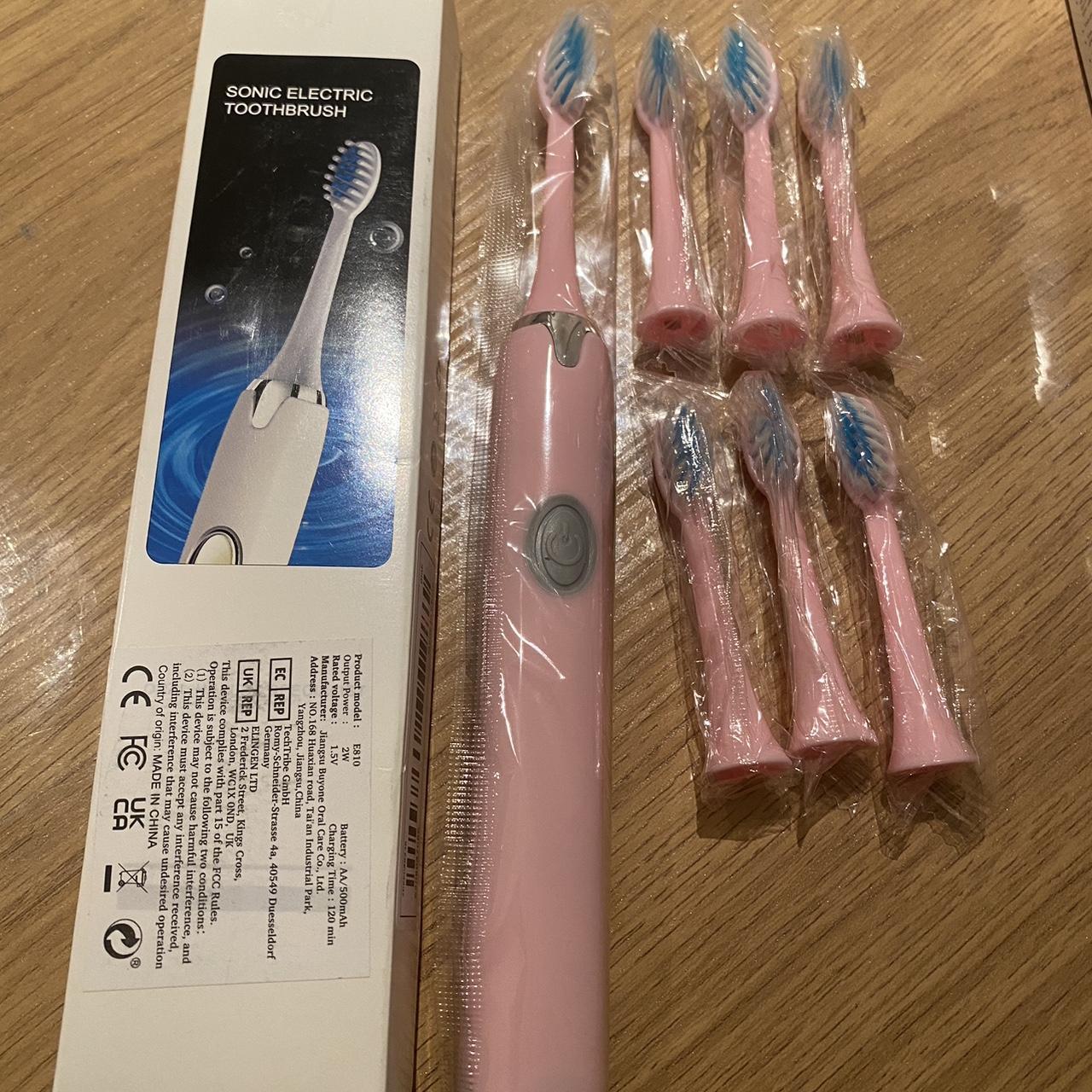 Sonic electric toothbrush pink - Depop