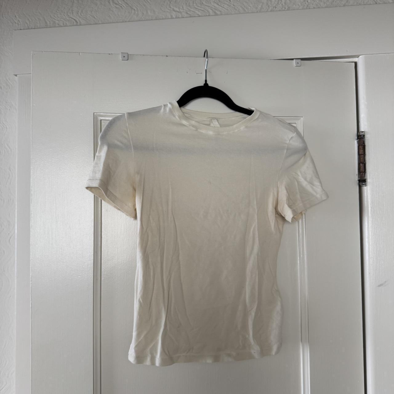 Cream colored Skims “fits everybody” shirt Lightly... | Depop