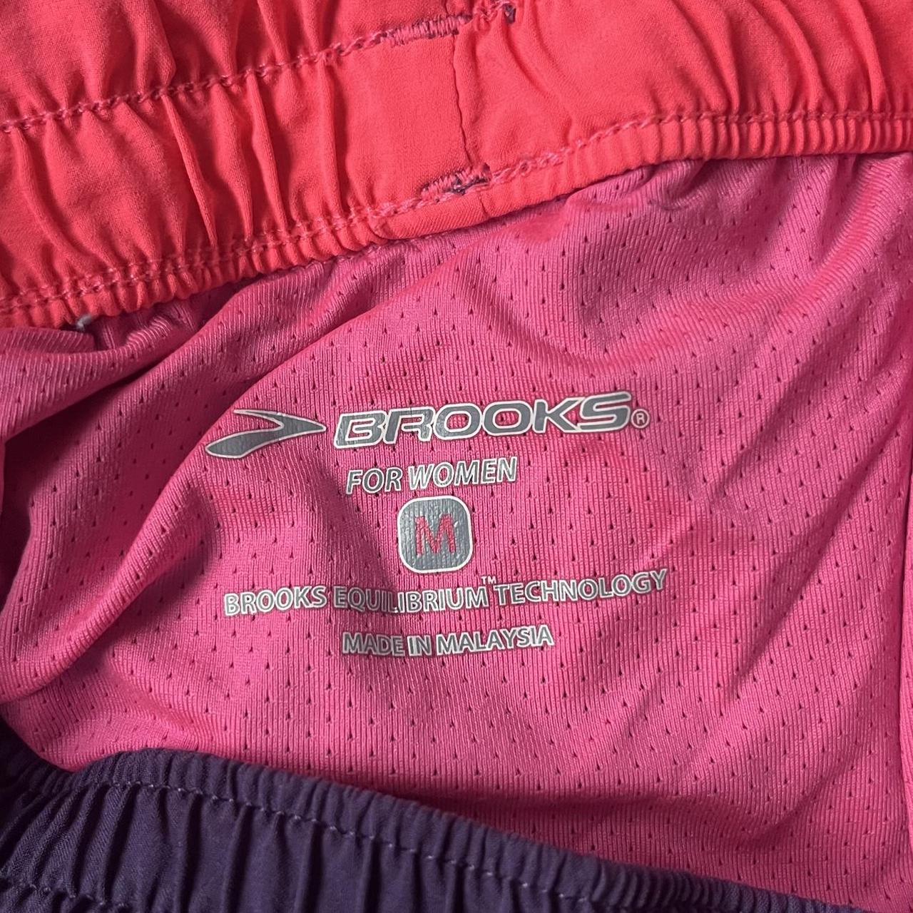 Brooks Running Shorts - purple & pink, size... - Depop