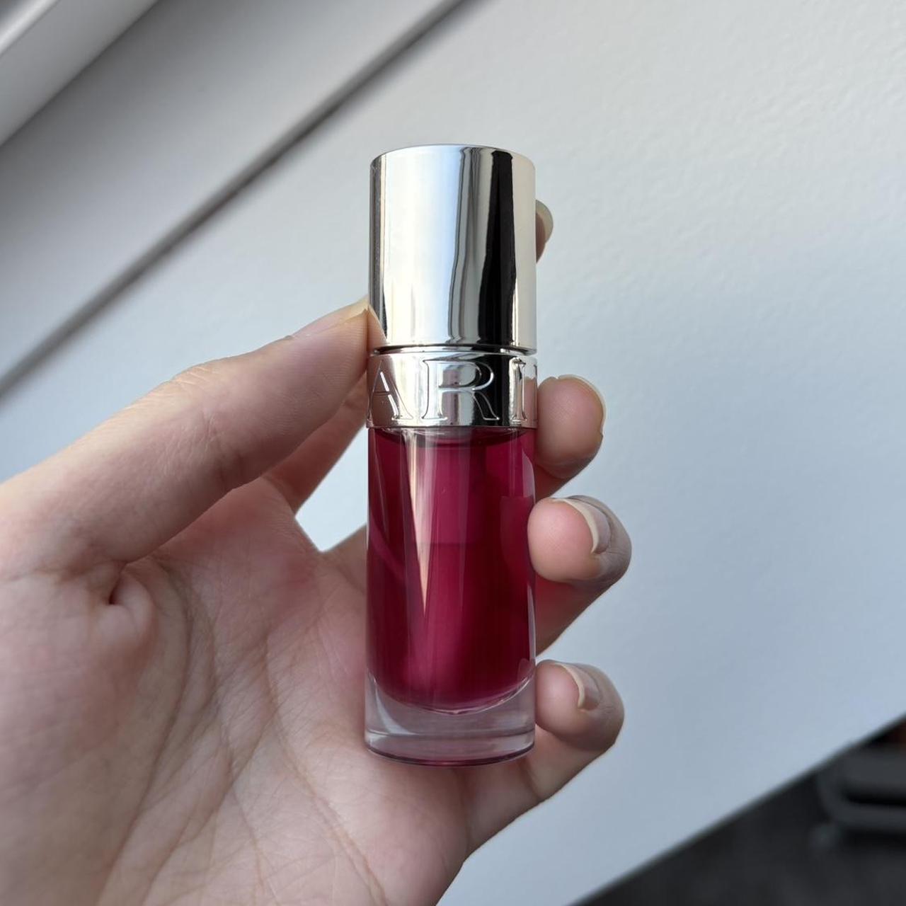 Clarins lip comfort oil in Raspberry Brand new... | Depop