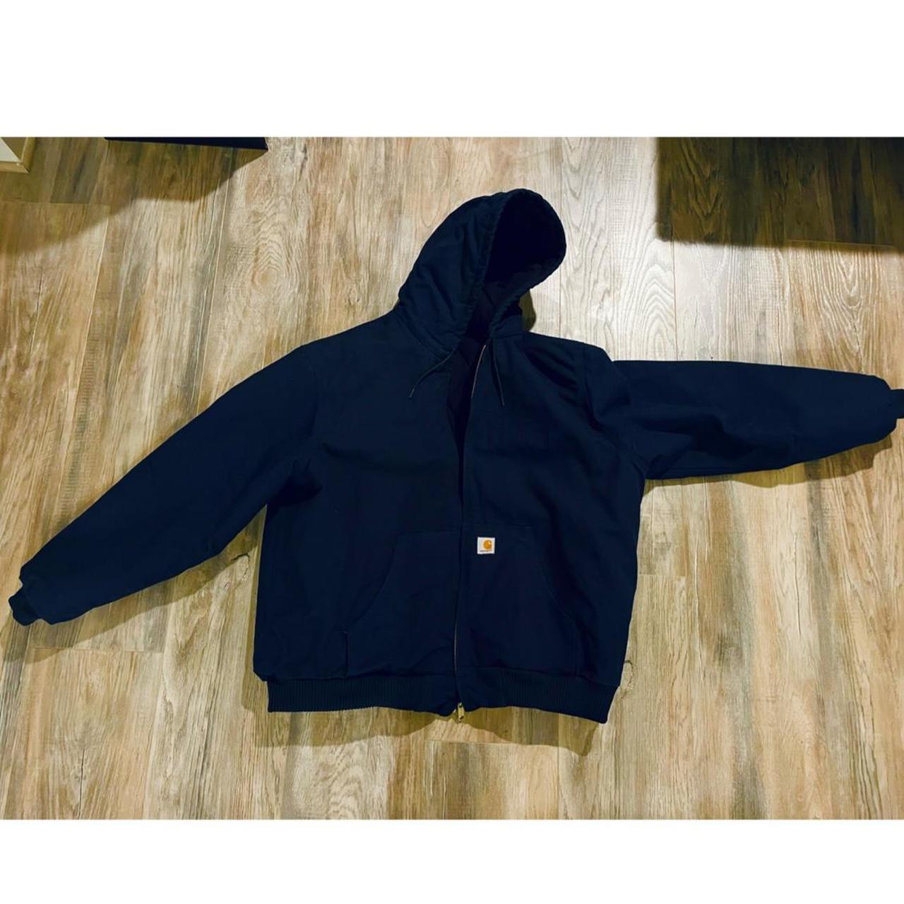 Navy blue Carhartt hooded work style jacket. Perfect... - Depop