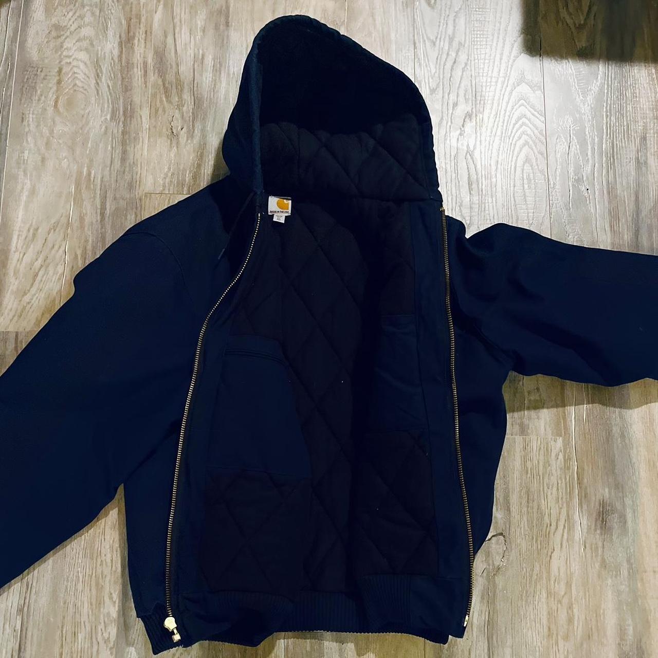 Navy blue Carhartt hooded work style jacket. Perfect... - Depop