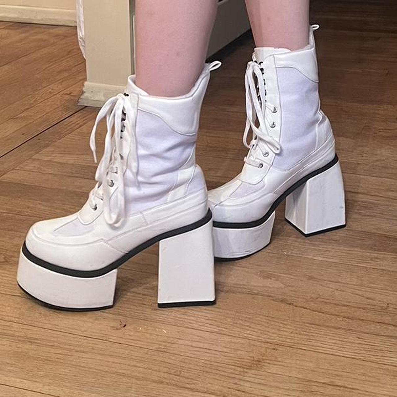 Fluffy platform boots. Scuff marks on side but... | Depop