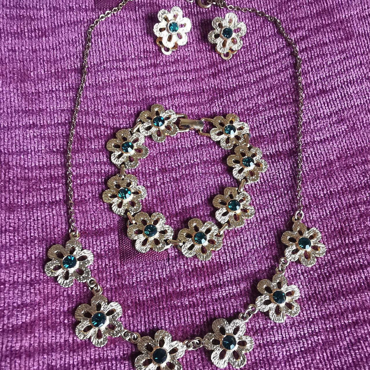 Gorgeous vintage green rhinestones flower design set... - Depop