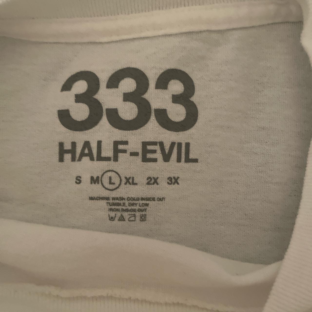 Half Evil white graphic... - Depop