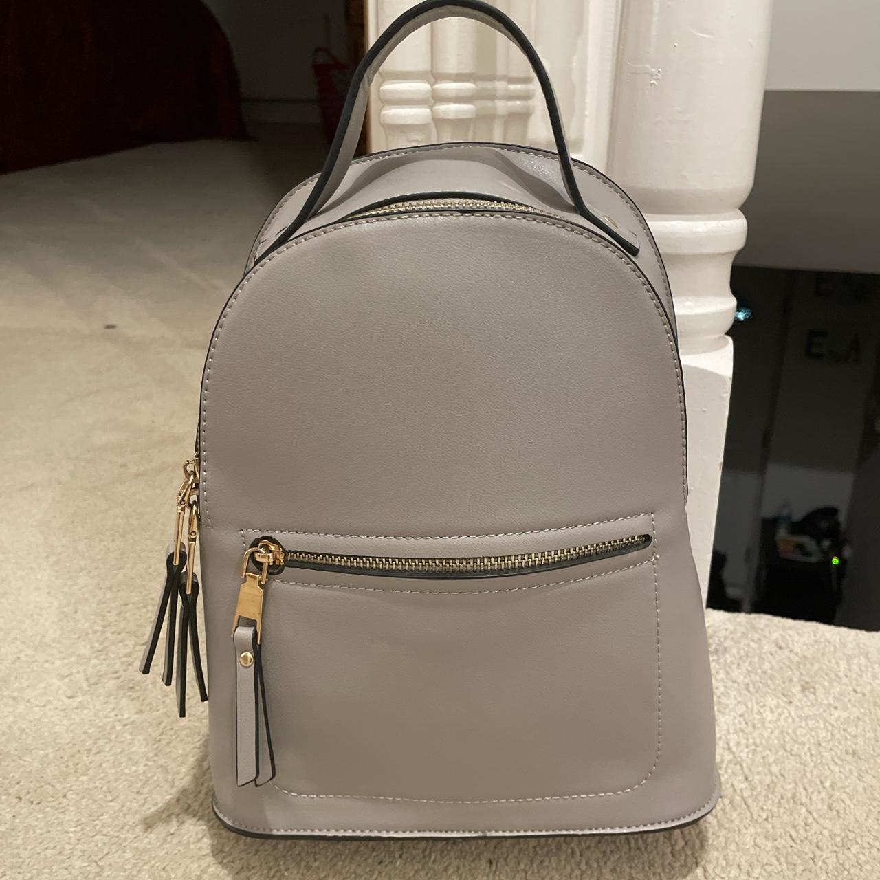 Small grey rucksack - only used once perfect... - Depop