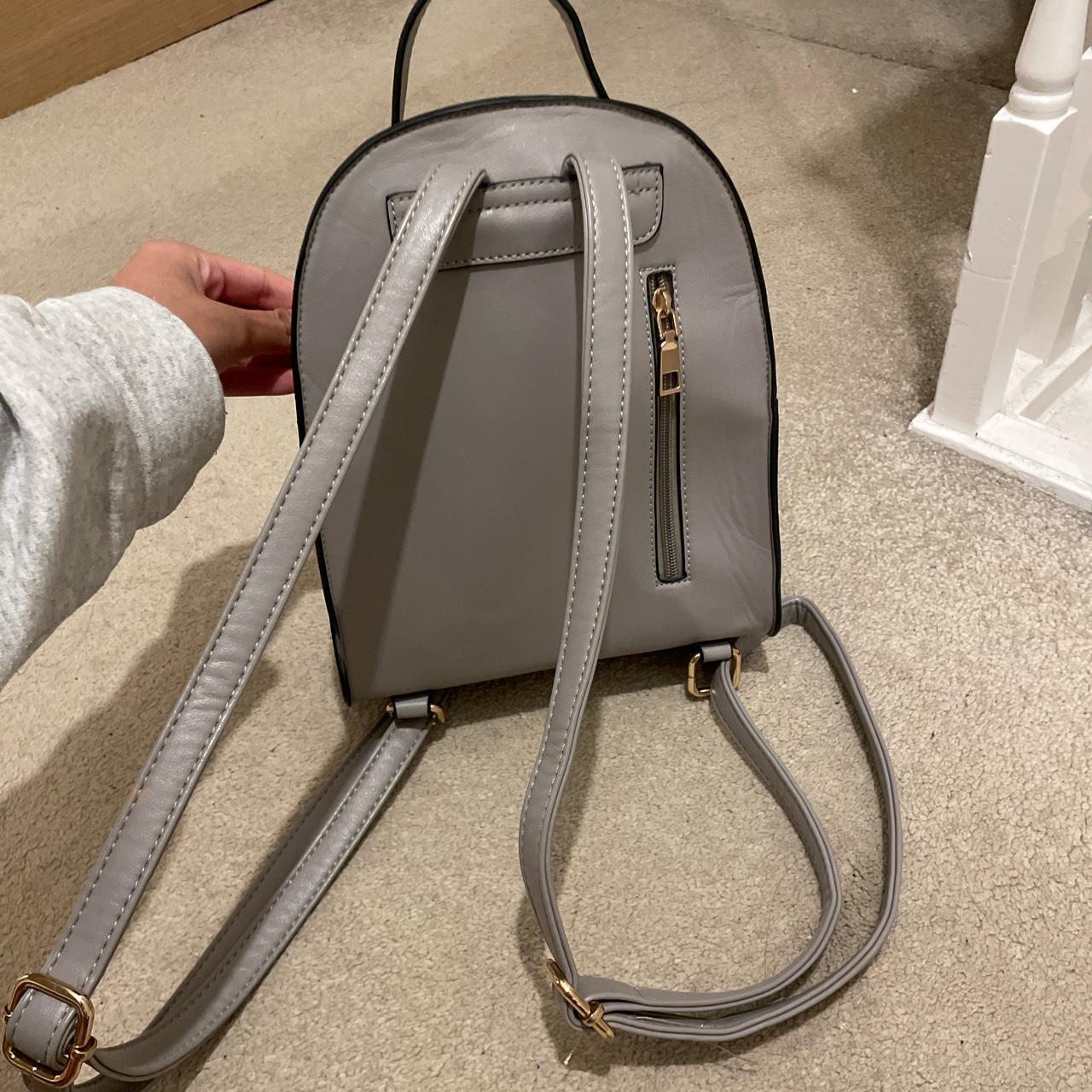Small grey rucksack - only used once perfect... - Depop
