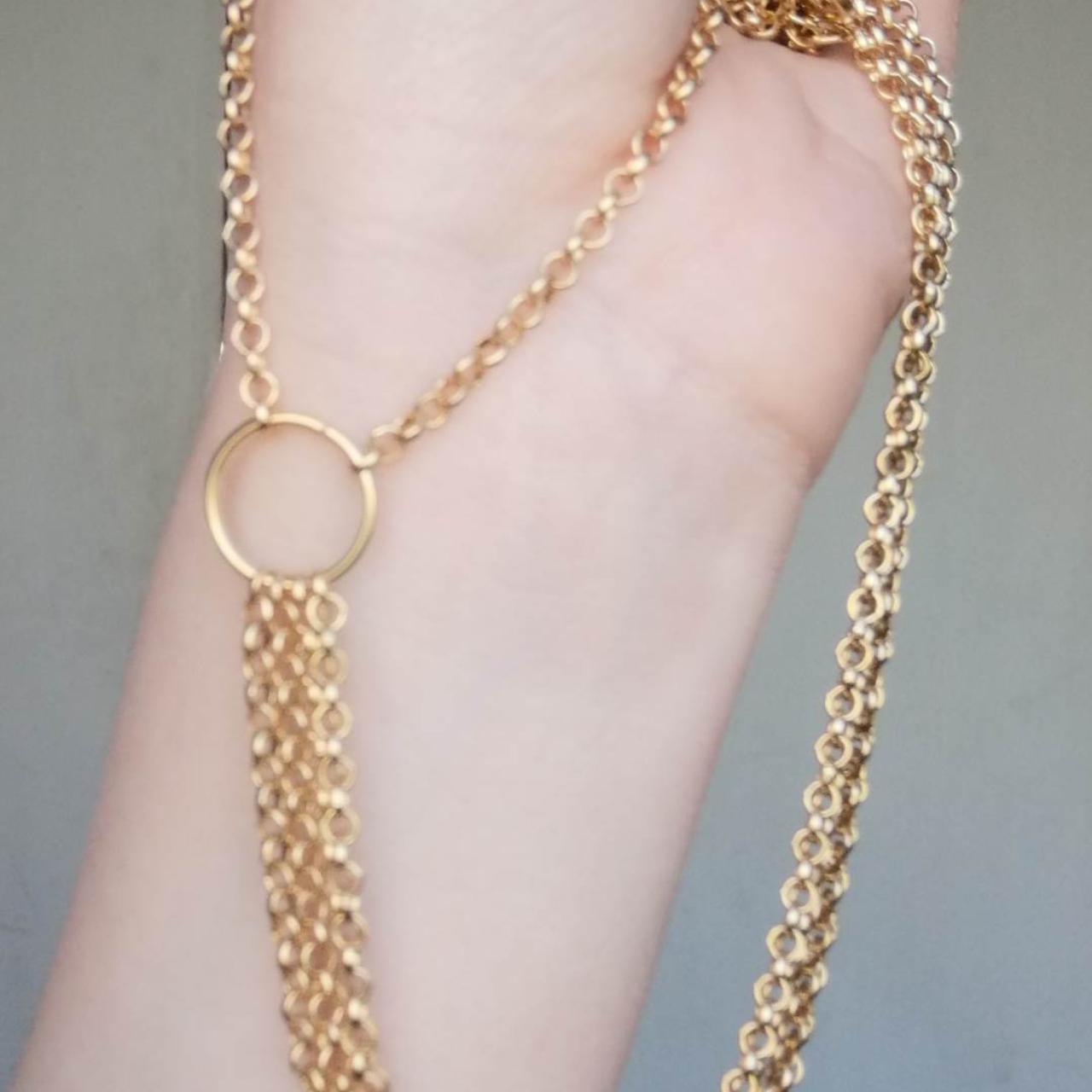 Delicate gold coloured chain chest harness... - Depop