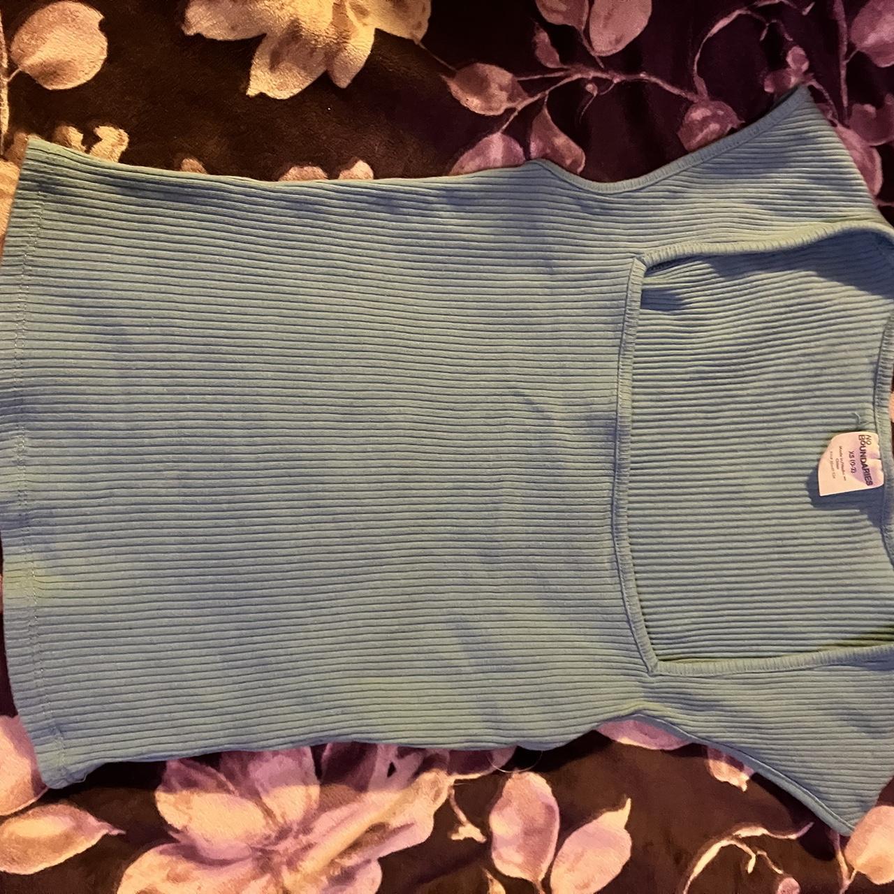 Super cute blue ribbed tank top size xs fits a small... | Depop