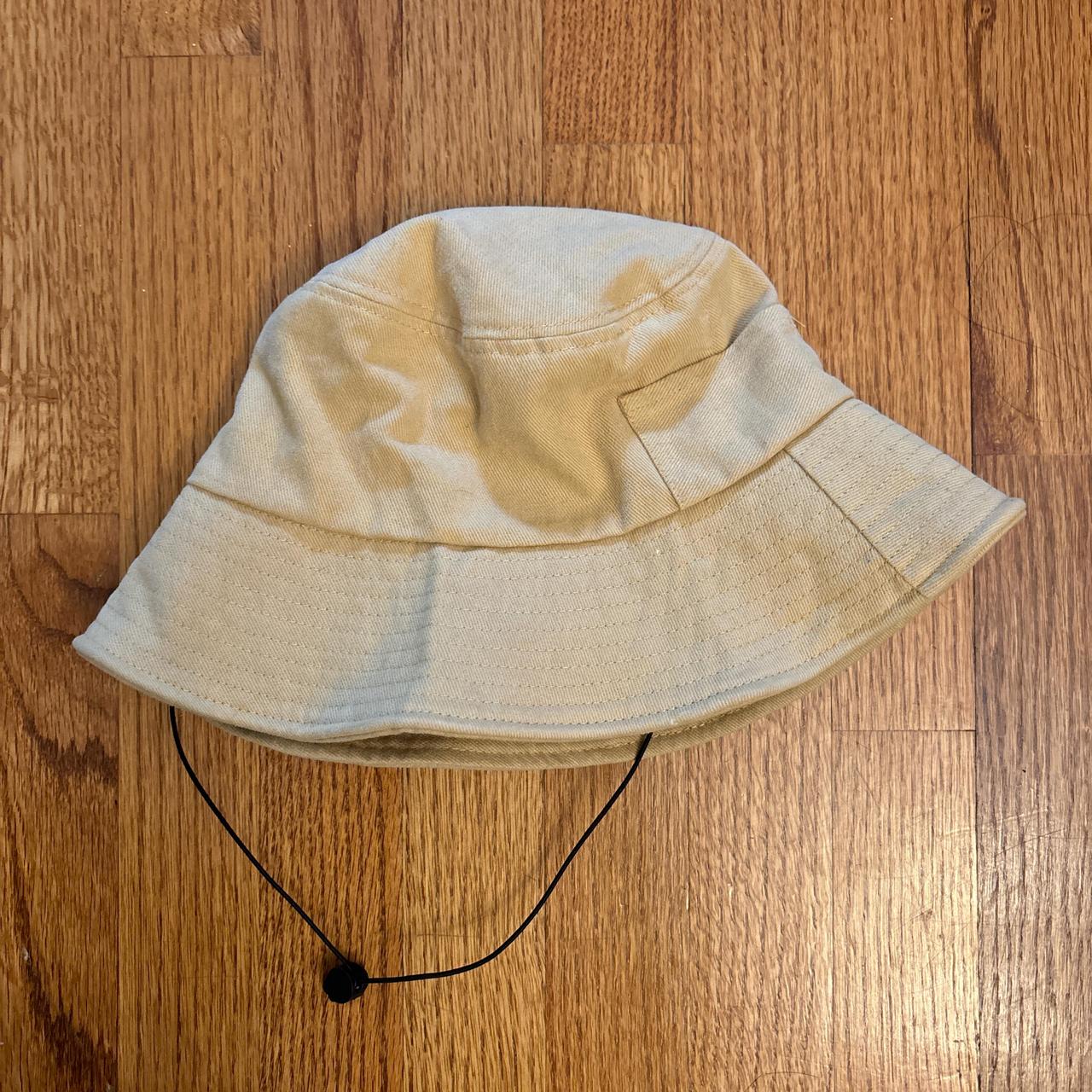 tan bucket hat with wire rim and adjustable chin... - Depop