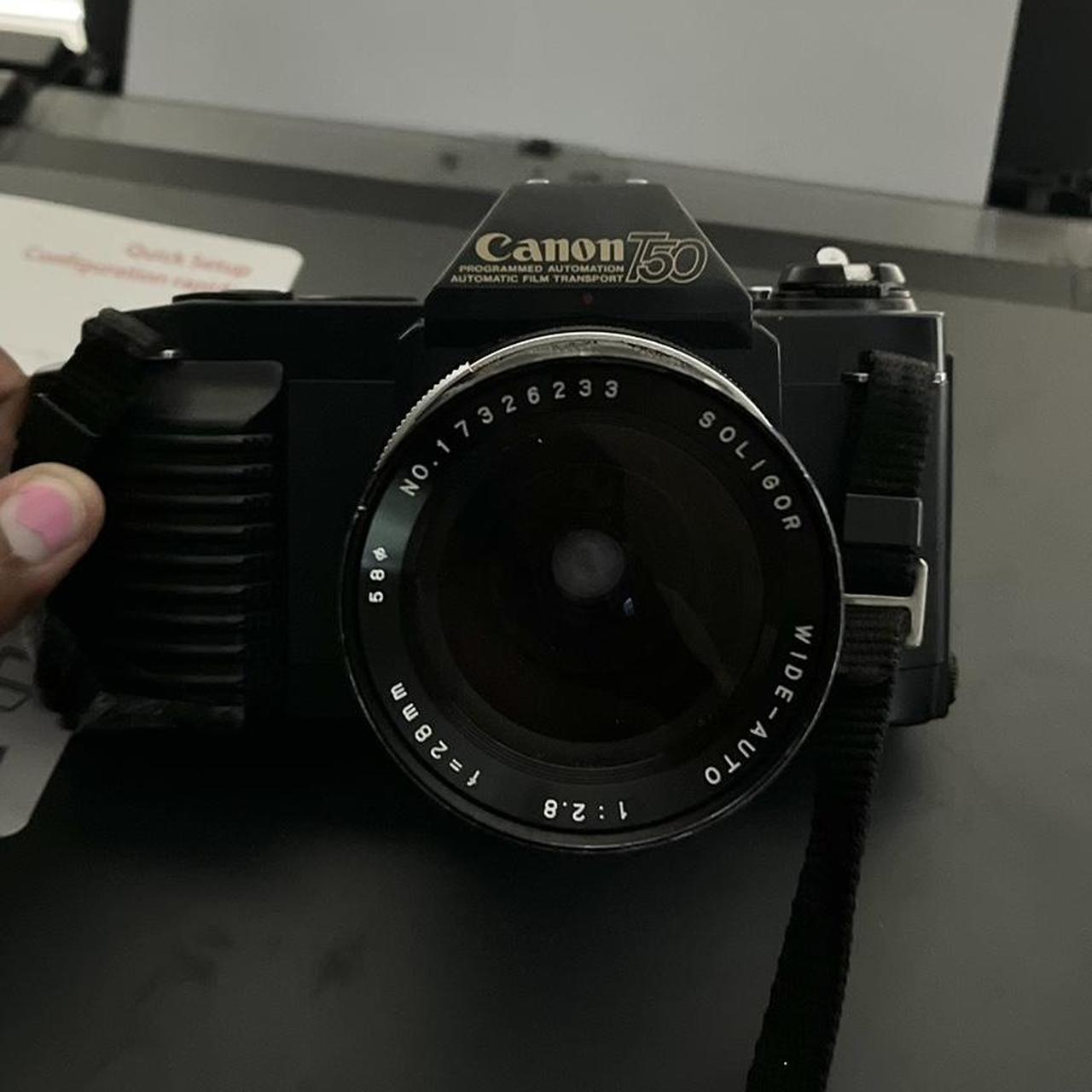Canon T50 vintage film camera. Works perfectly fine... - Depop