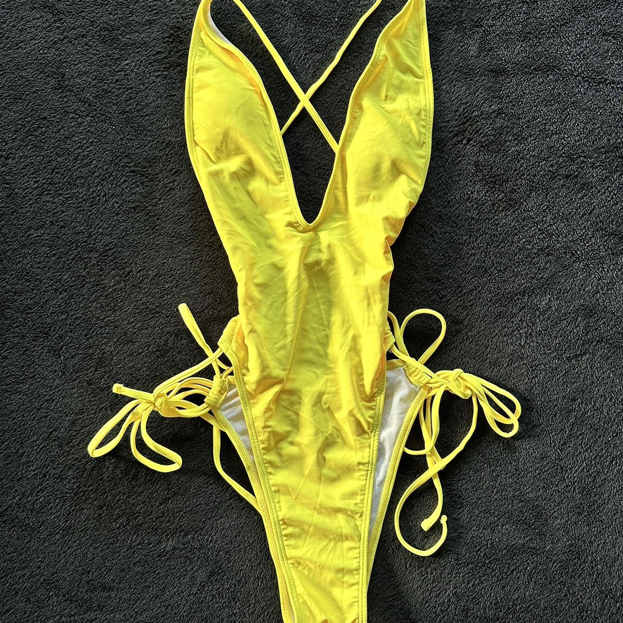 Yellow high rise one piece swimsuit with cross back... - Depop