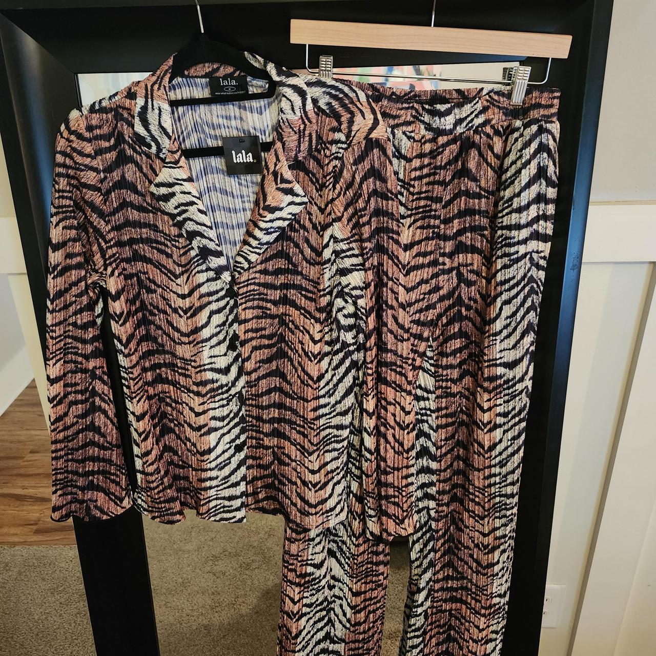 Dressed in LALA Tiger print 2 piece set. Never... | Depop
