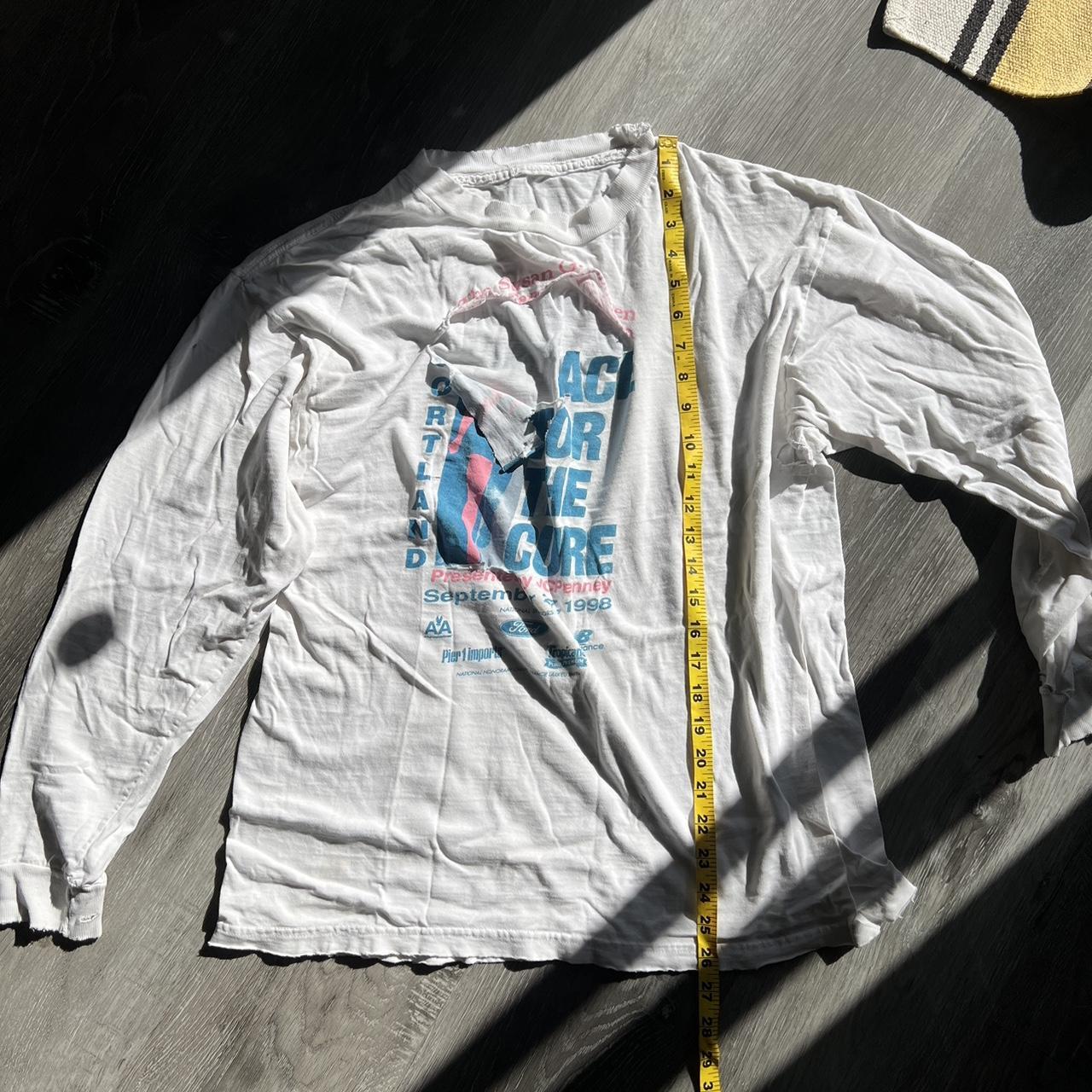 Vintage “running” t shirt Worn thin over the... - Depop