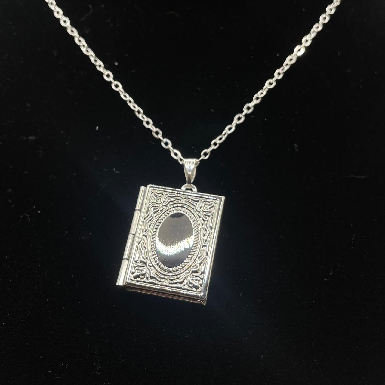 Medium-sized deadstock silver book-shaped locket.... - Depop