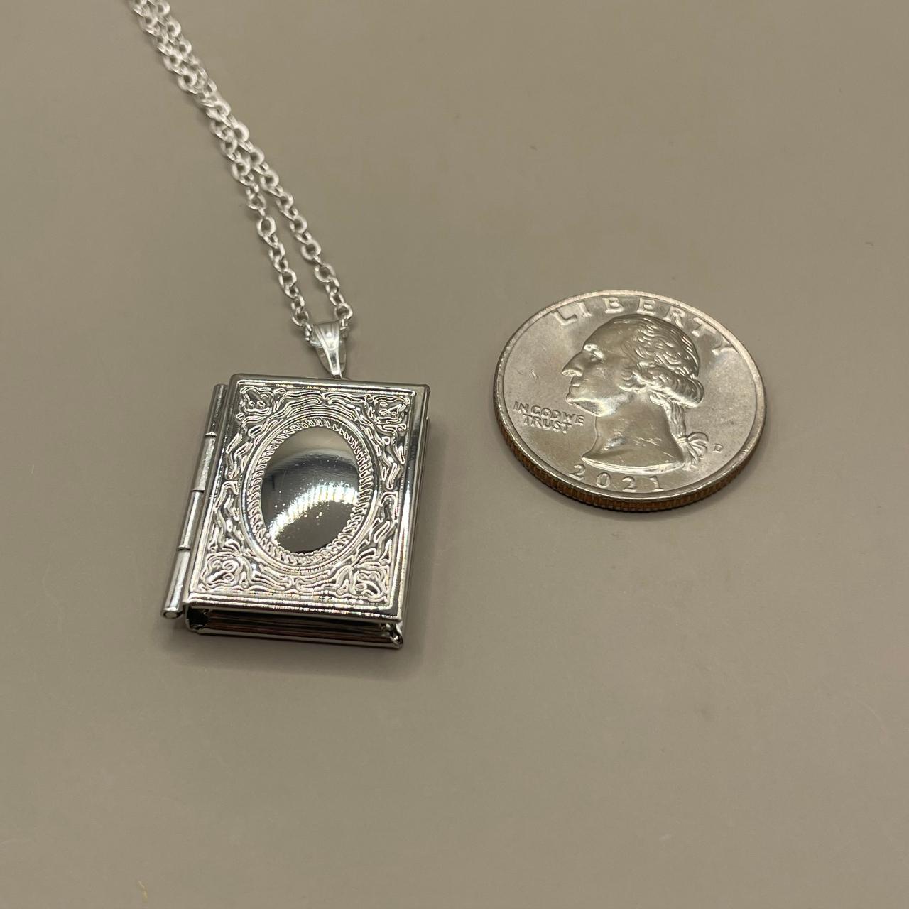 Medium-sized deadstock silver book-shaped locket.... - Depop