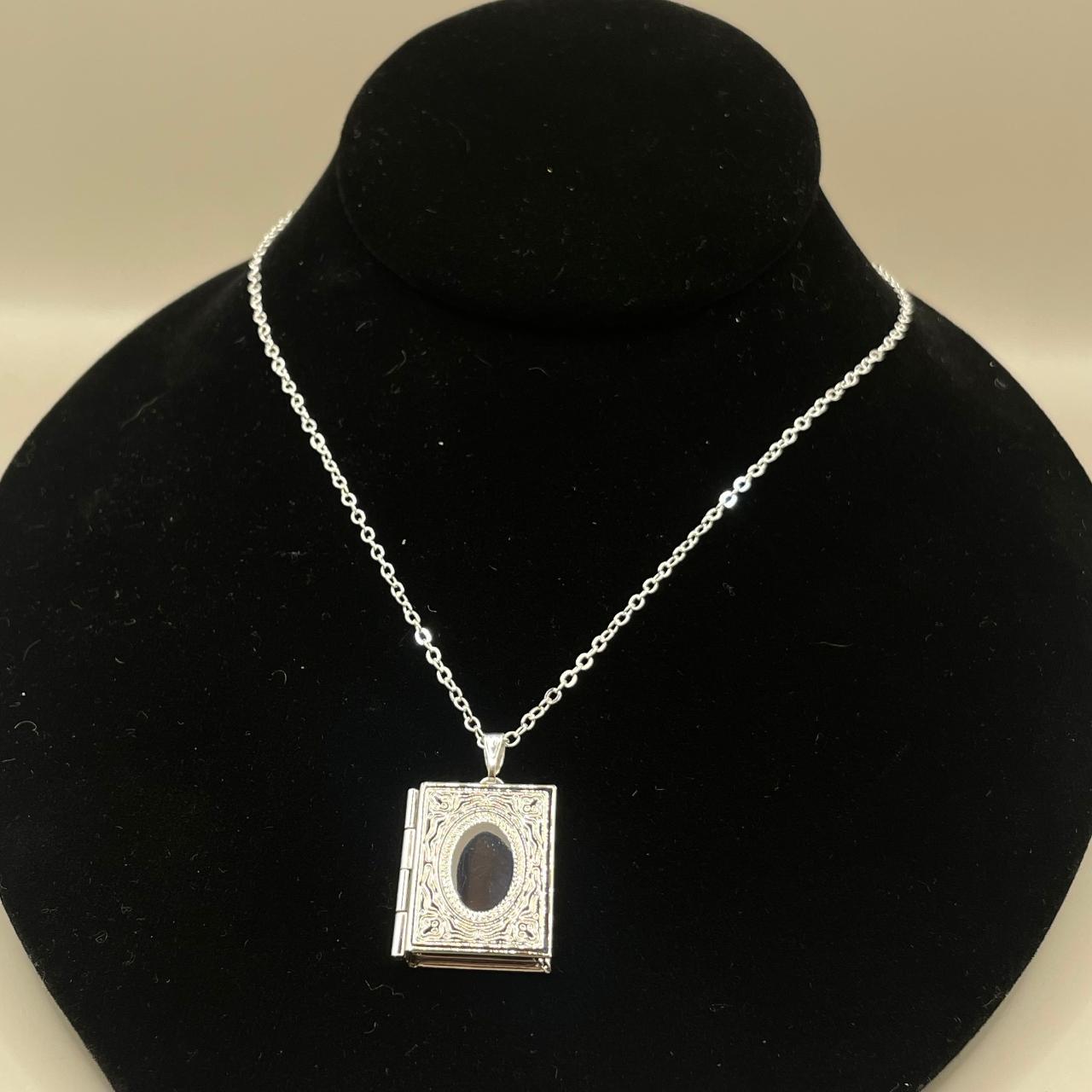 Medium-sized deadstock silver book-shaped locket.... - Depop