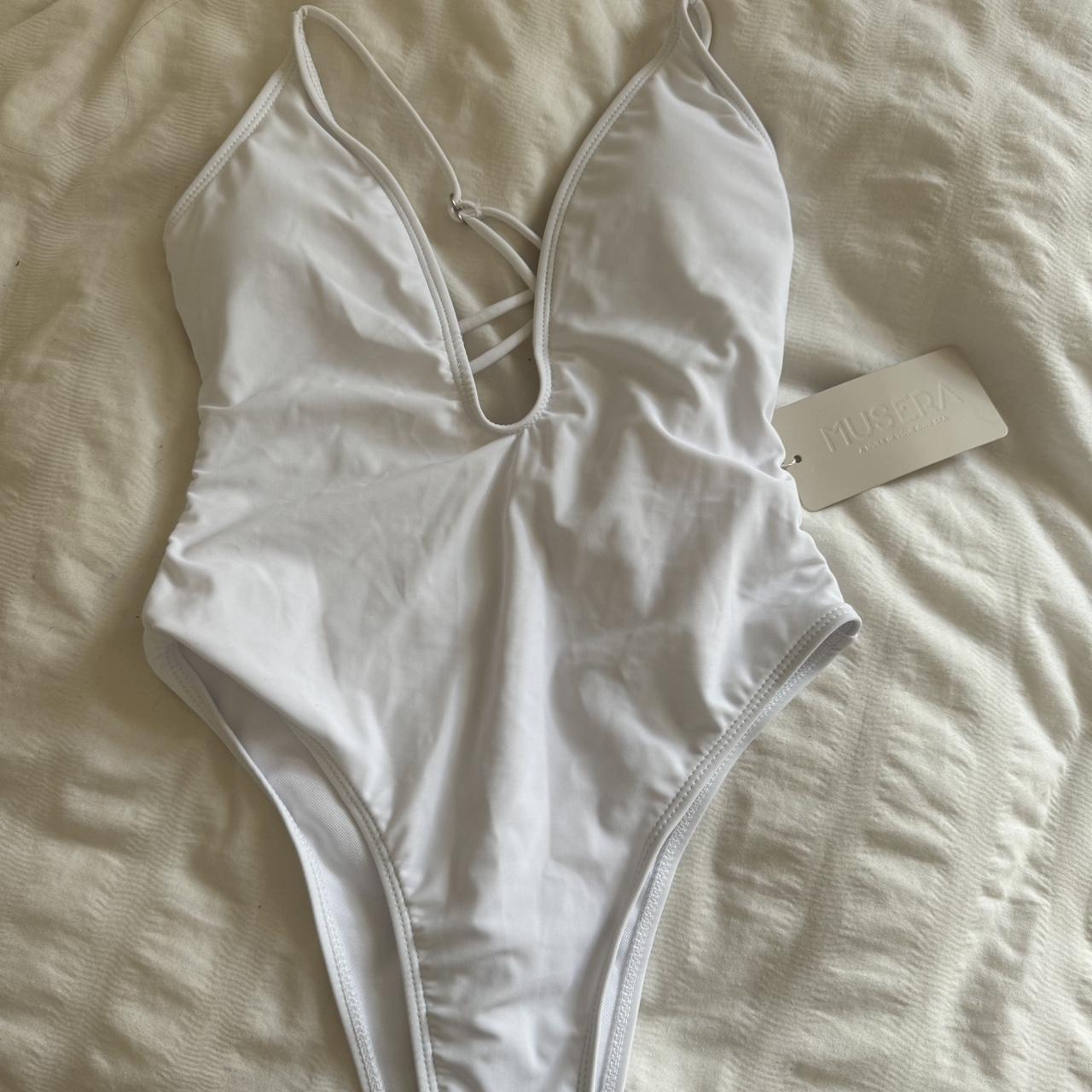 NEVER WORK BRAND NEW MUSERA FLATTERING ONE PIECE,... | Depop