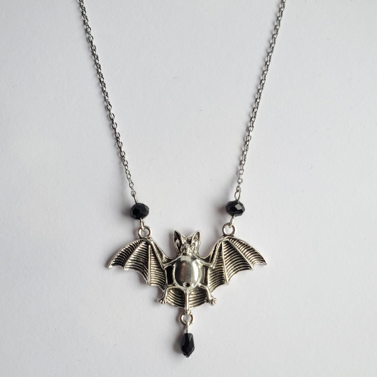 bat chain necklace the diameter of the bat is 5cm... - Depop