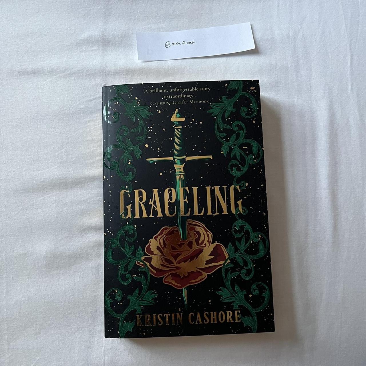First book in the Graceling series by Kristin... - Depop