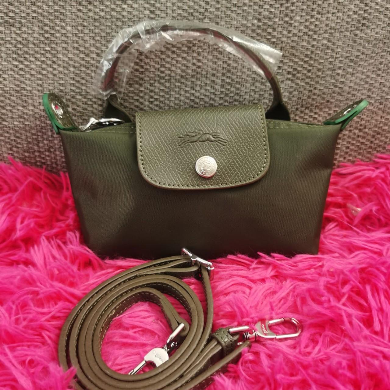 Longchamp le pliage mini forest green pouch bag with... | Depop