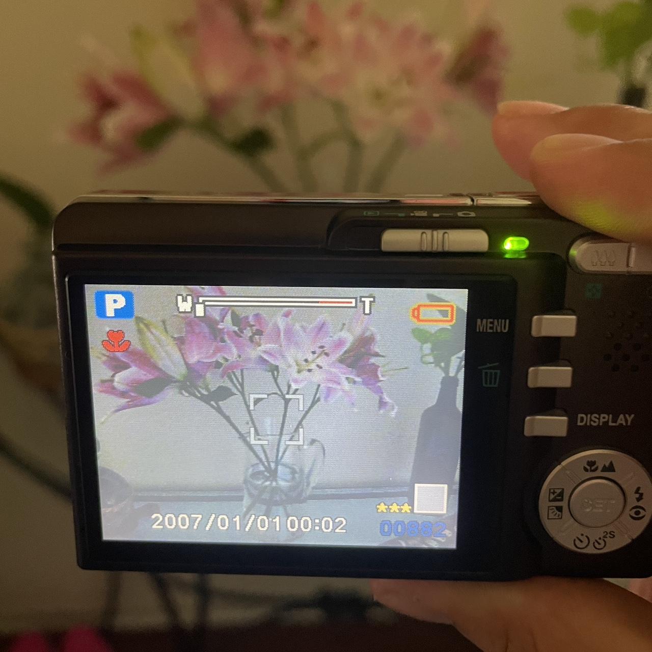 rare brand new brown sanyo digital camera comes in... - Depop