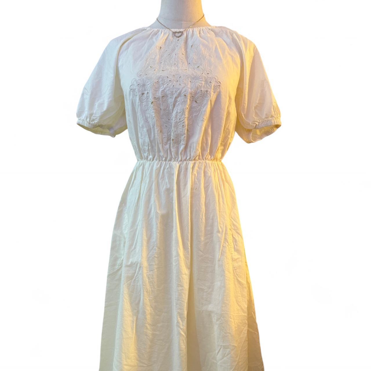 Cream linen dress with tie back detail below the... | Depop