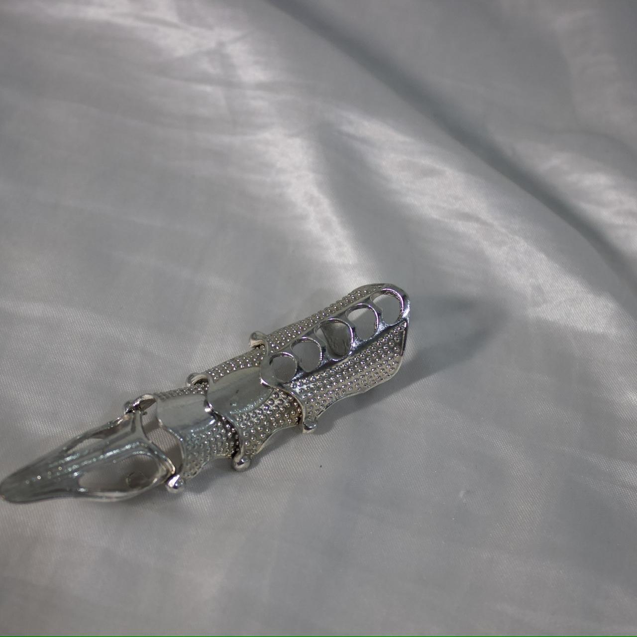 Silver skull finger spikes, comes with both finger... | Depop