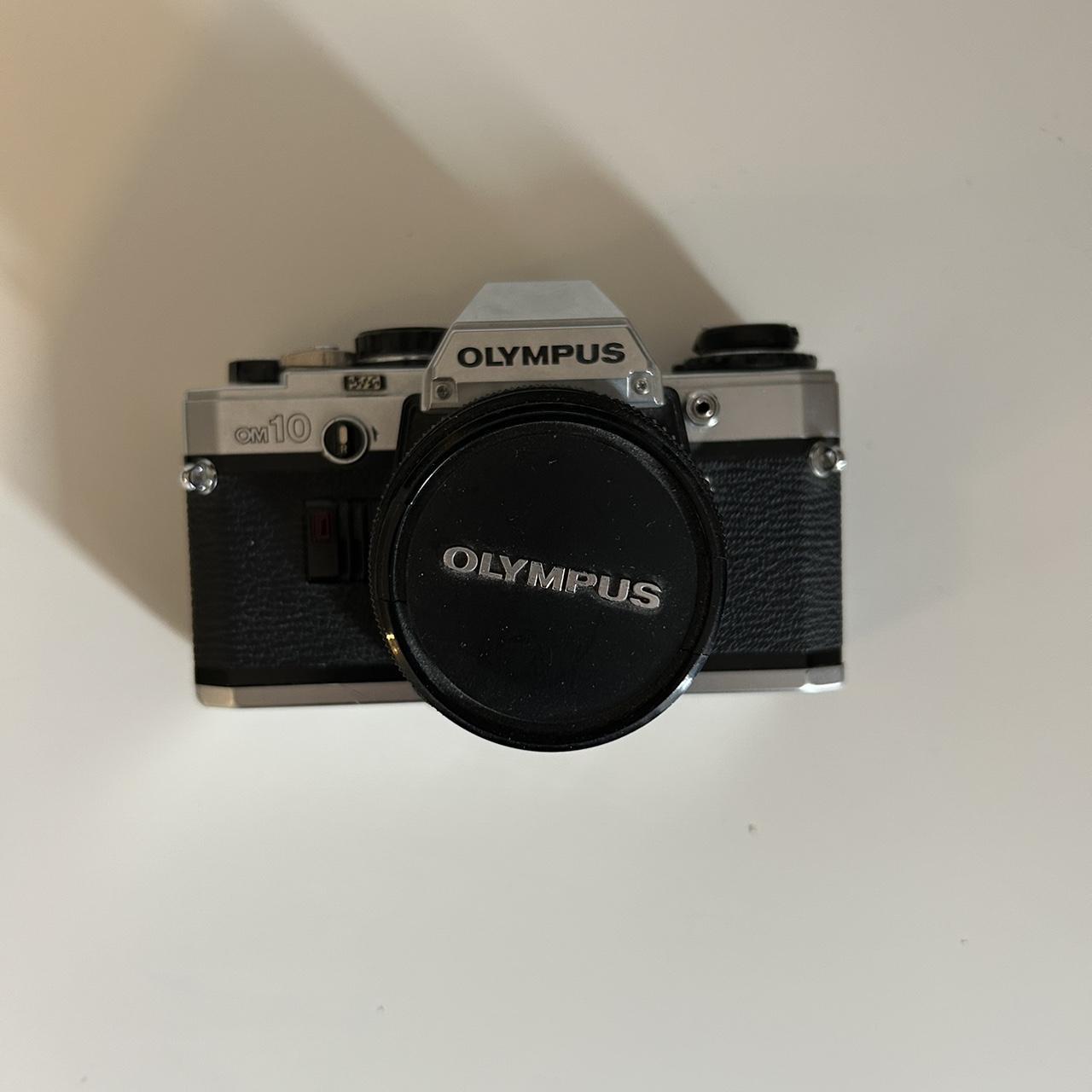 Olympus OM10 #camera #film #filmcamera #35mm #olympus - Depop