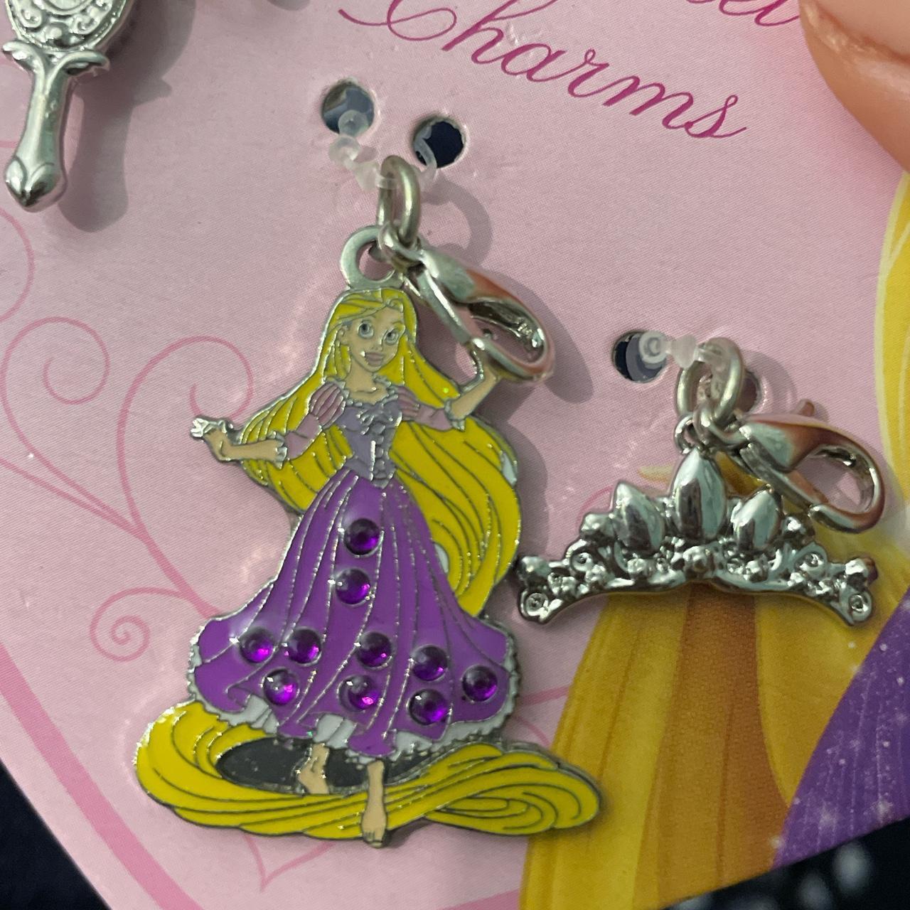 Tangled Rapunzel bracket charms from the coronation... - Depop