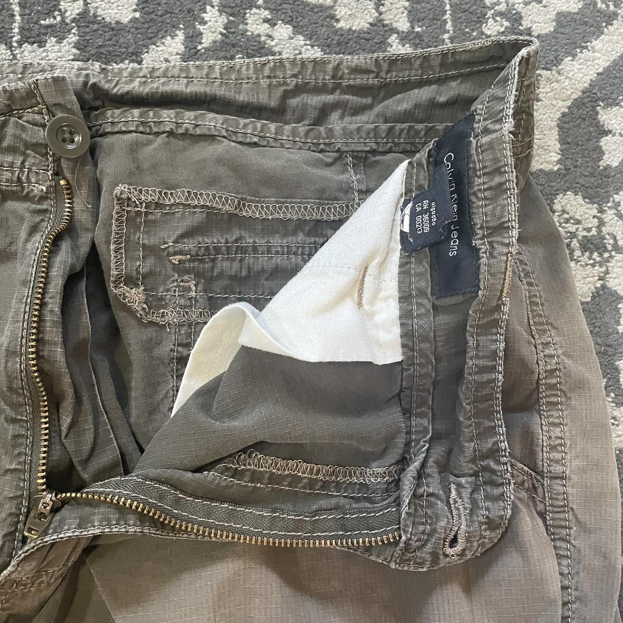 Calvin Klein Cargo Shorts - Good condition, some... - Depop