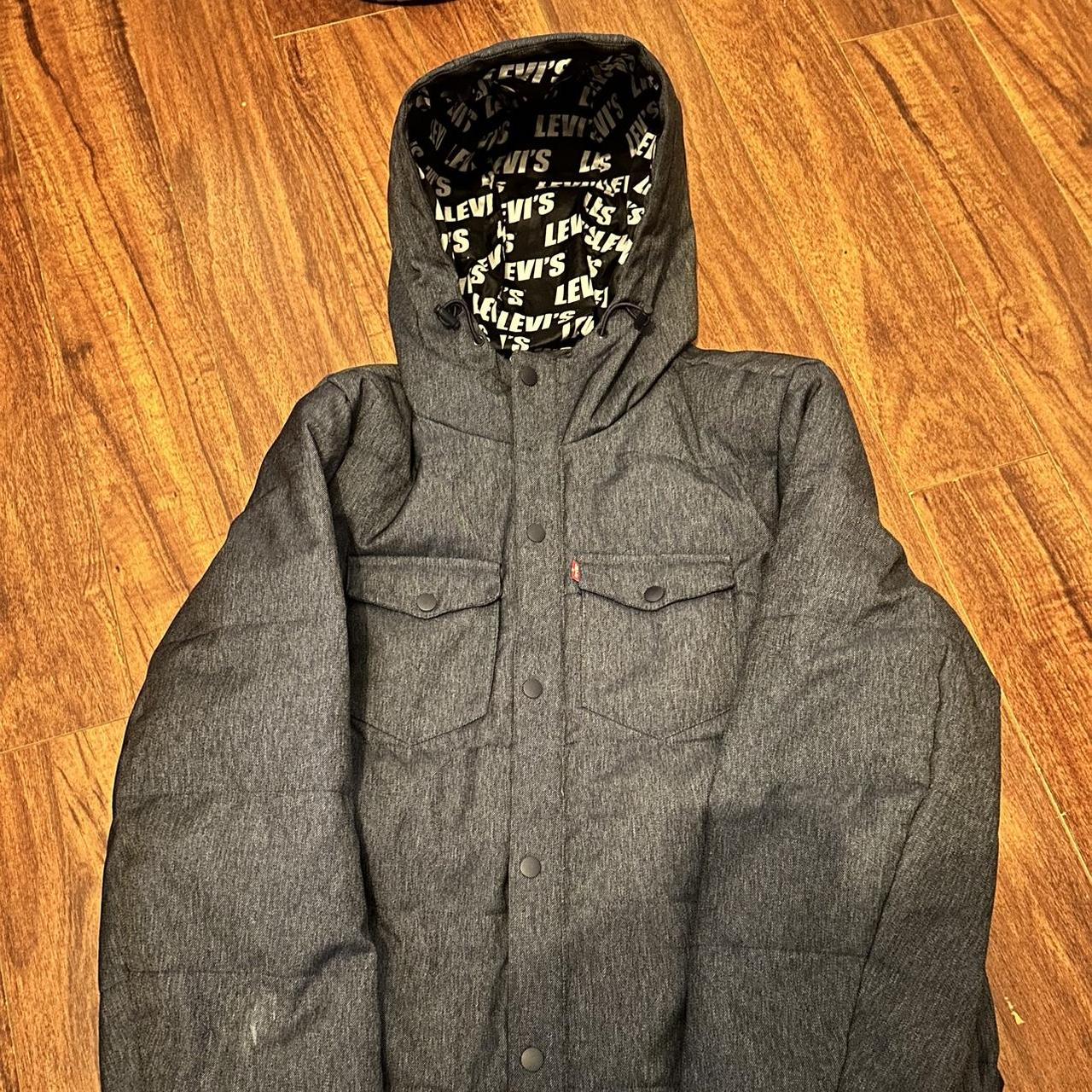 Levi's Puffer jacket with tuff inside graphics - Depop