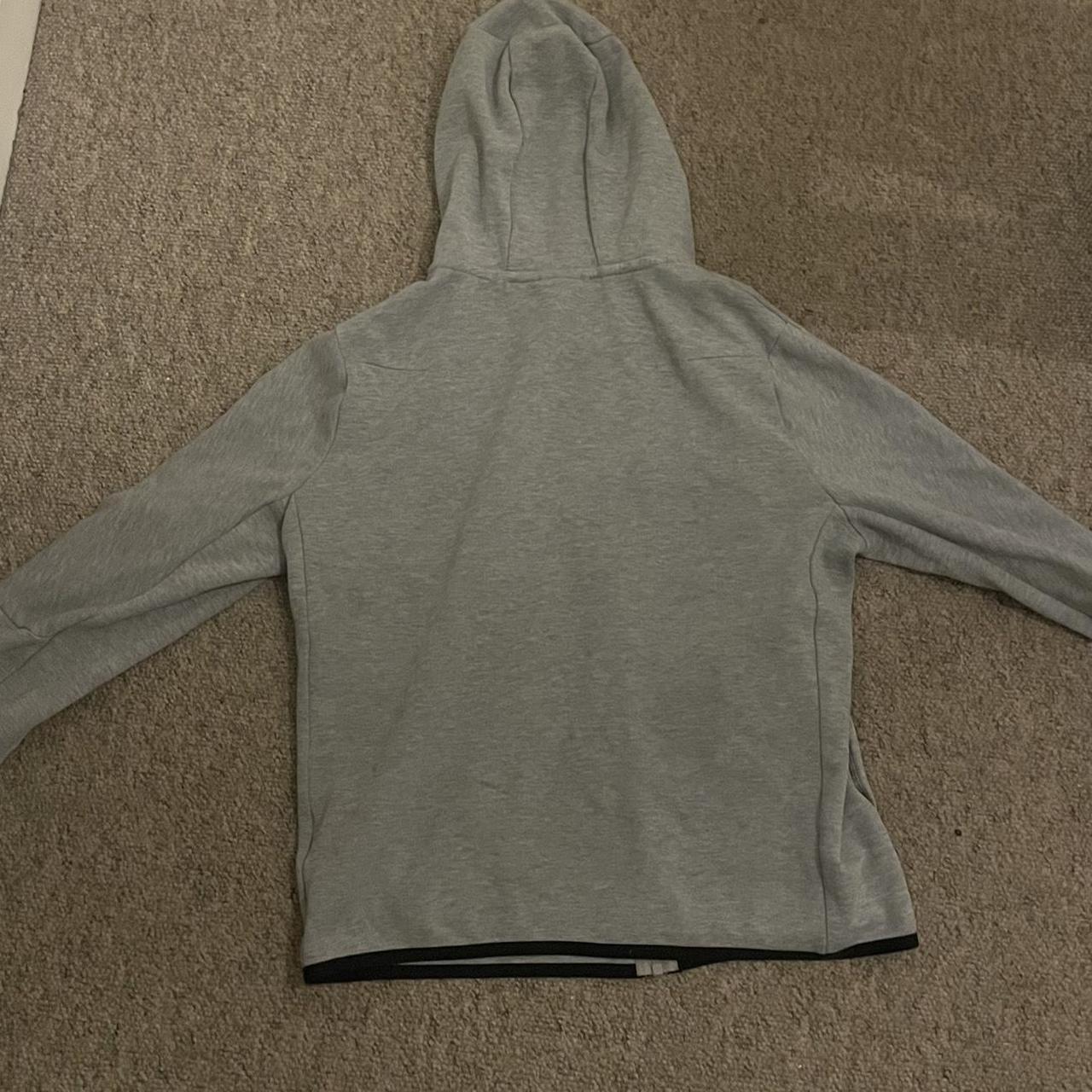 grey nike tech fleece kids XL small stain under the... - Depop