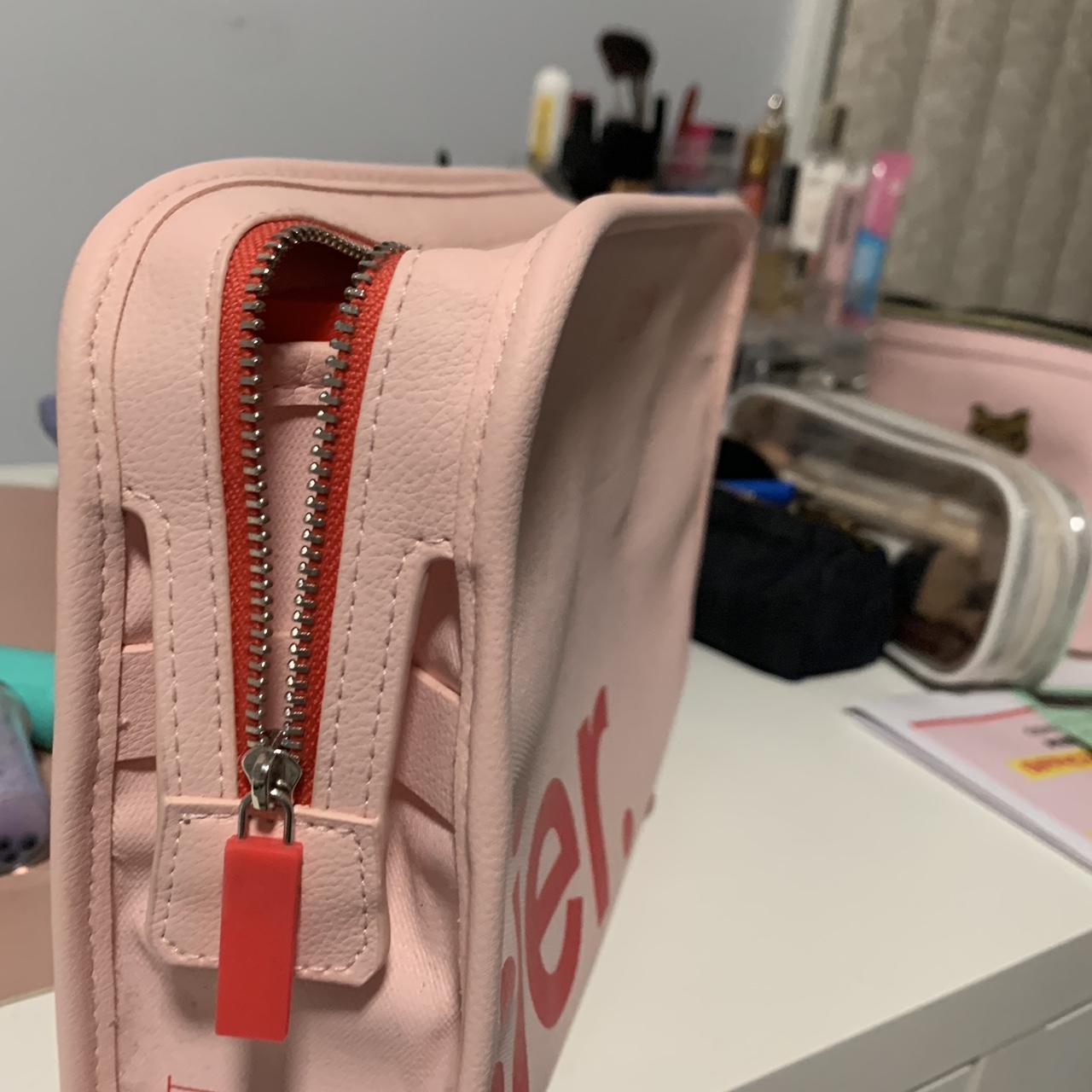 Glossier makeup bag with red insert inside - Depop
