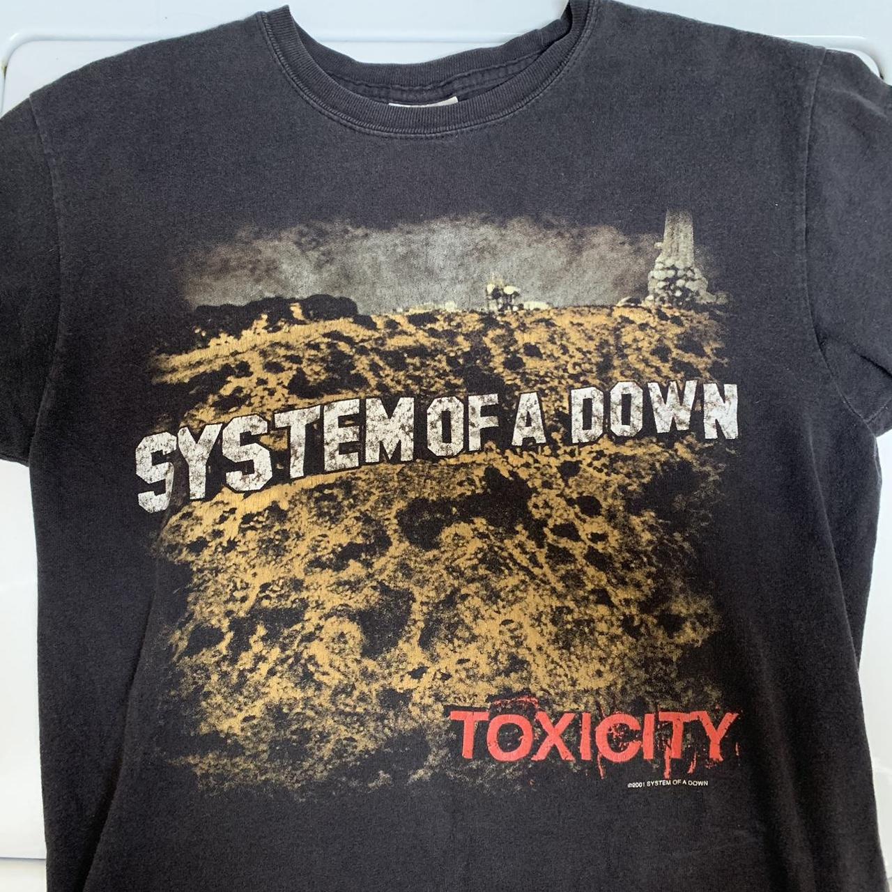vintage system of a down toxicity shirt. says... - Depop
