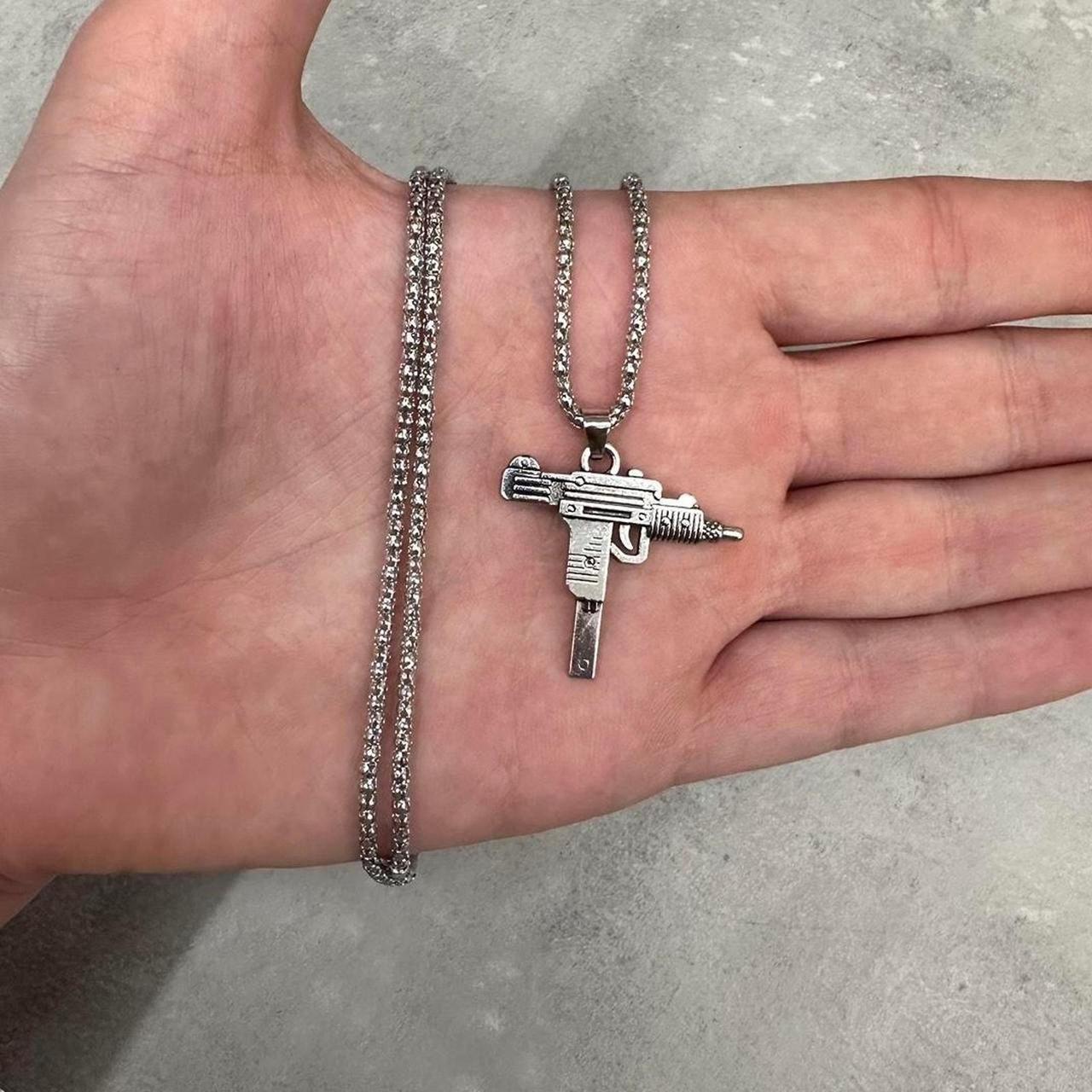 y2k silver mini uzi necklace chain in stainless... - Depop