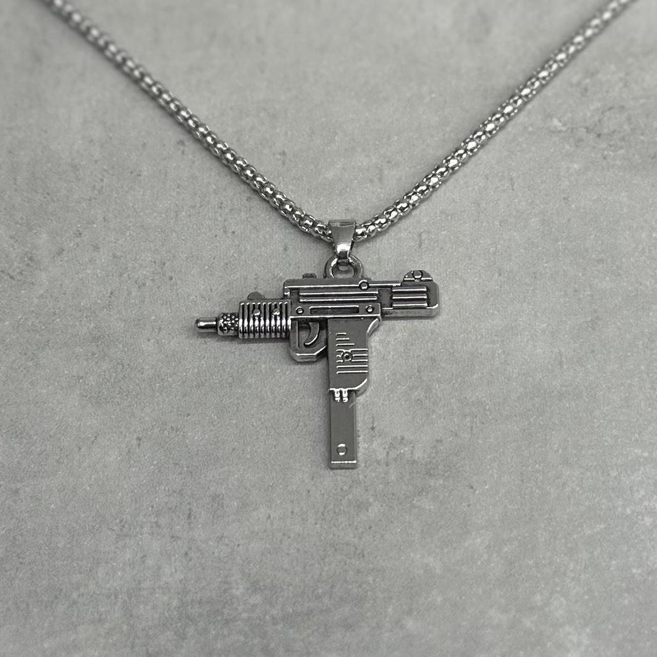 y2k silver mini uzi necklace chain in stainless... - Depop