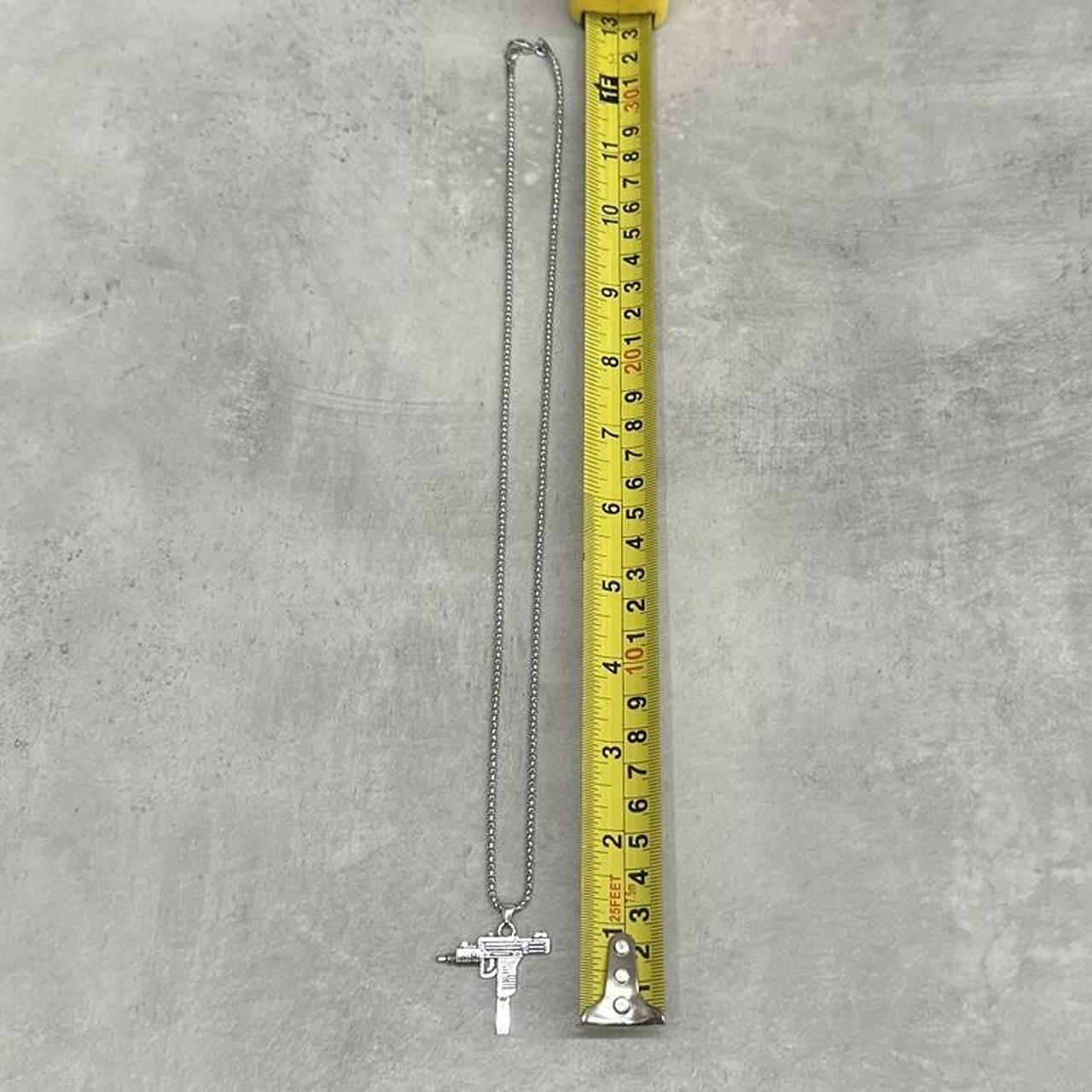y2k silver mini uzi necklace chain in stainless... - Depop