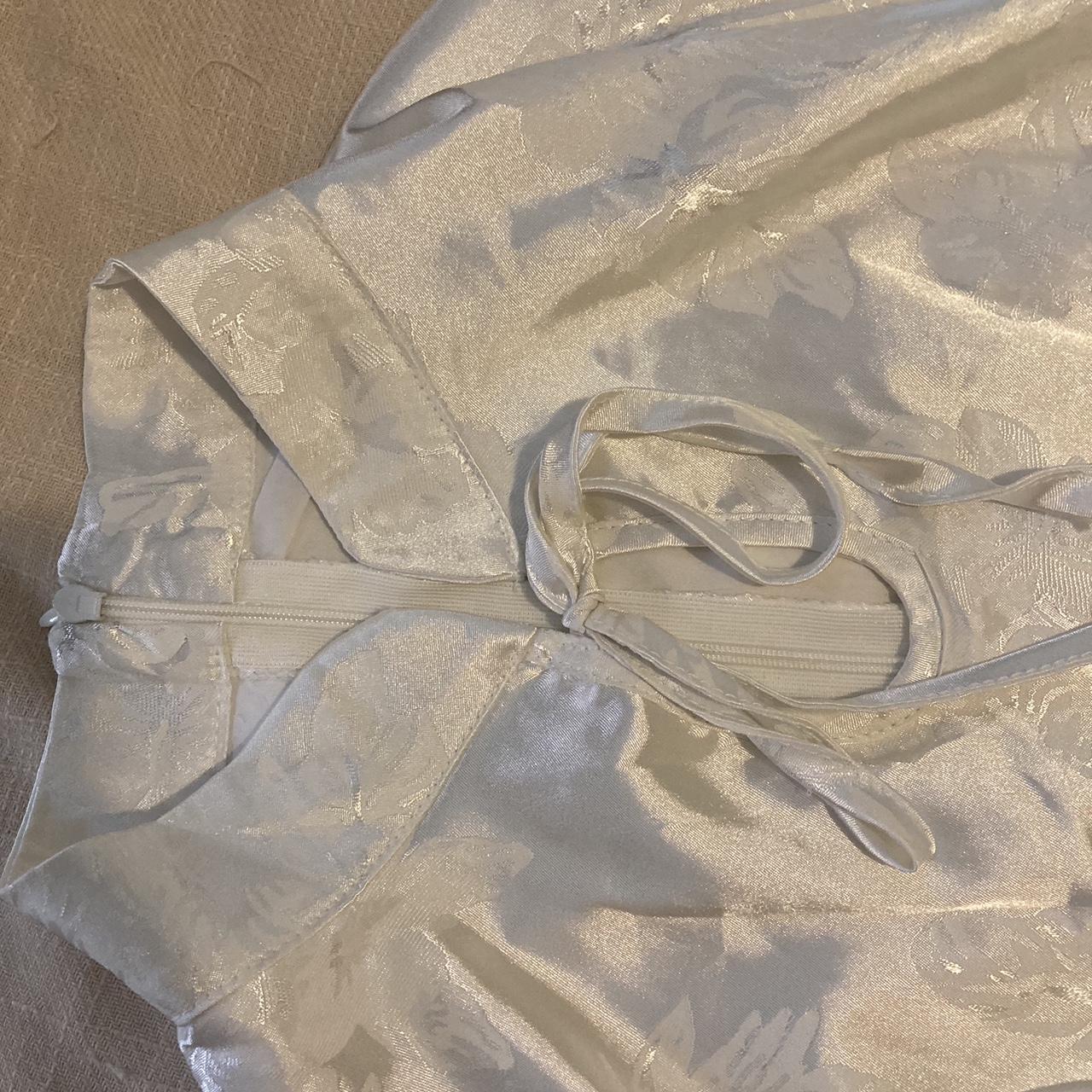 White floral qipao with a string tied keyhole neck,... - Depop