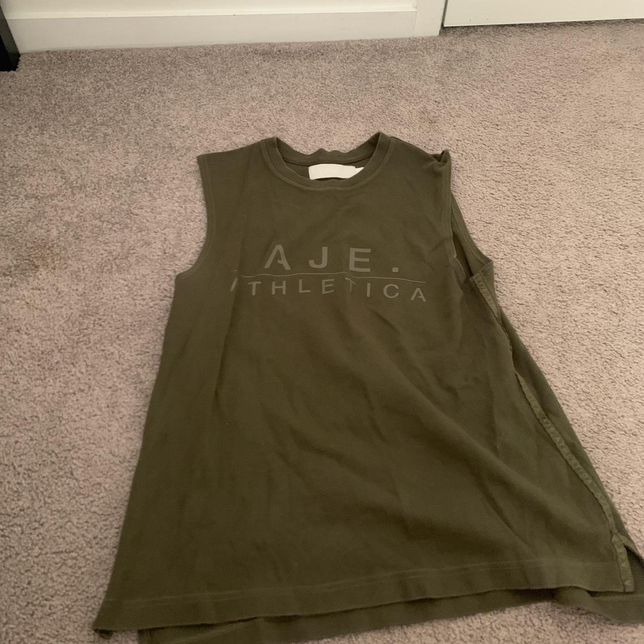 Aje Athletica tank size 04 can fit a 6 - Depop