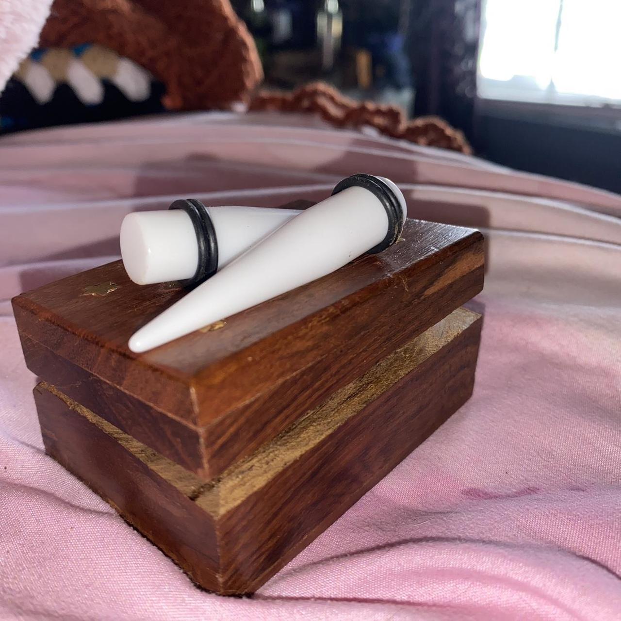 White tapers/cone plugs with black o-rings, perfect... | Depop